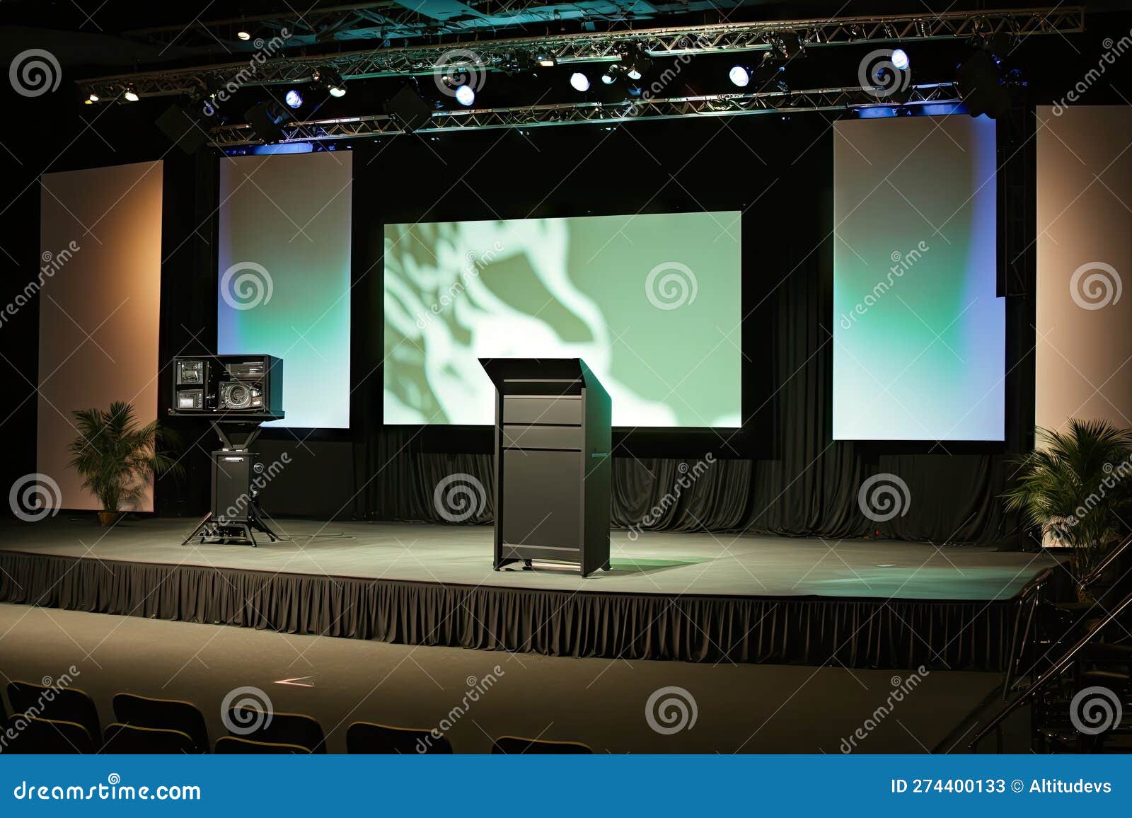 A Stage with a Speaker System and Large Video Screen for Presentations ...