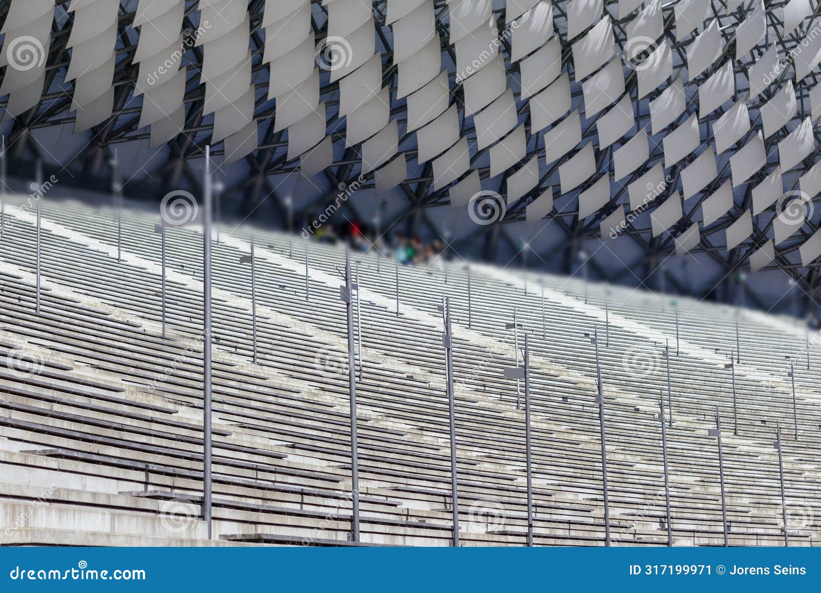 .a Stage with Wooden Benches and an Acoustic Metal Wall Structure at ...