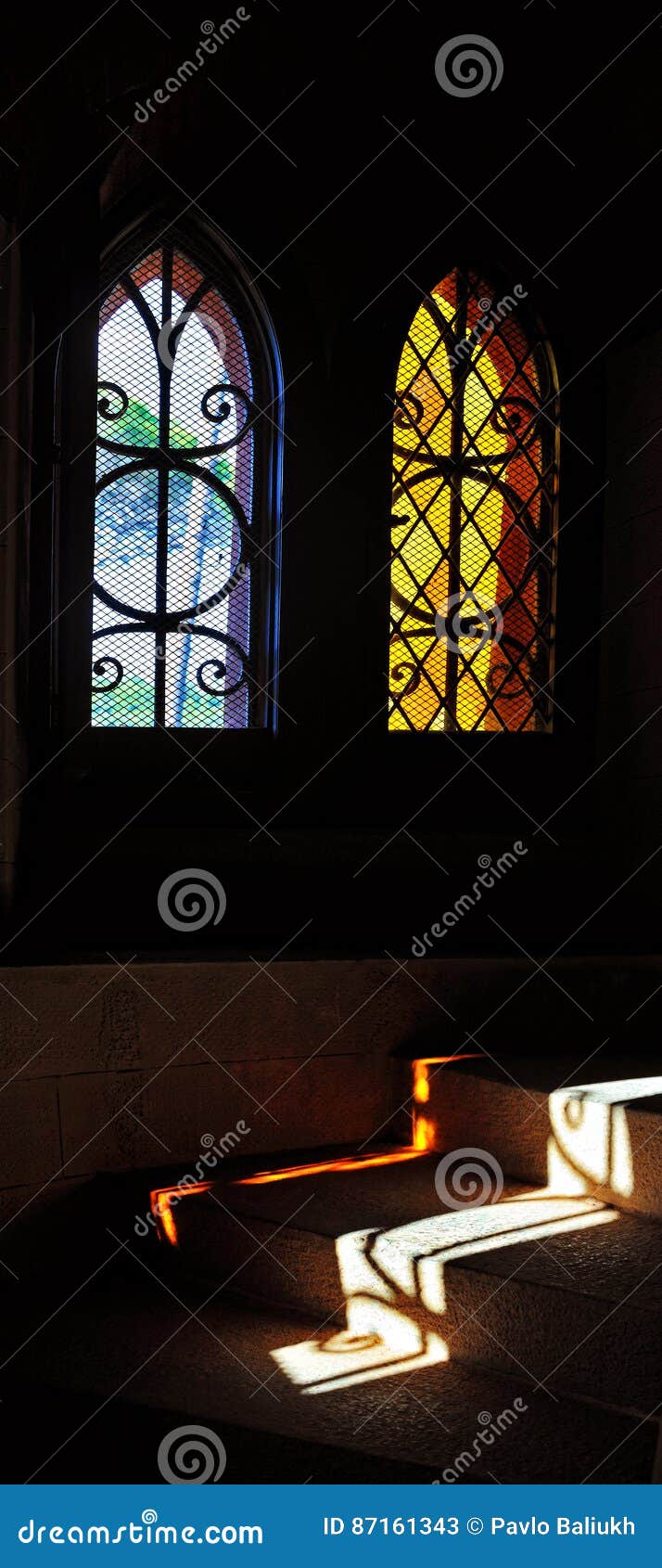Stained Glass Reflections with Reflections on the Stairs Stock Image ...
