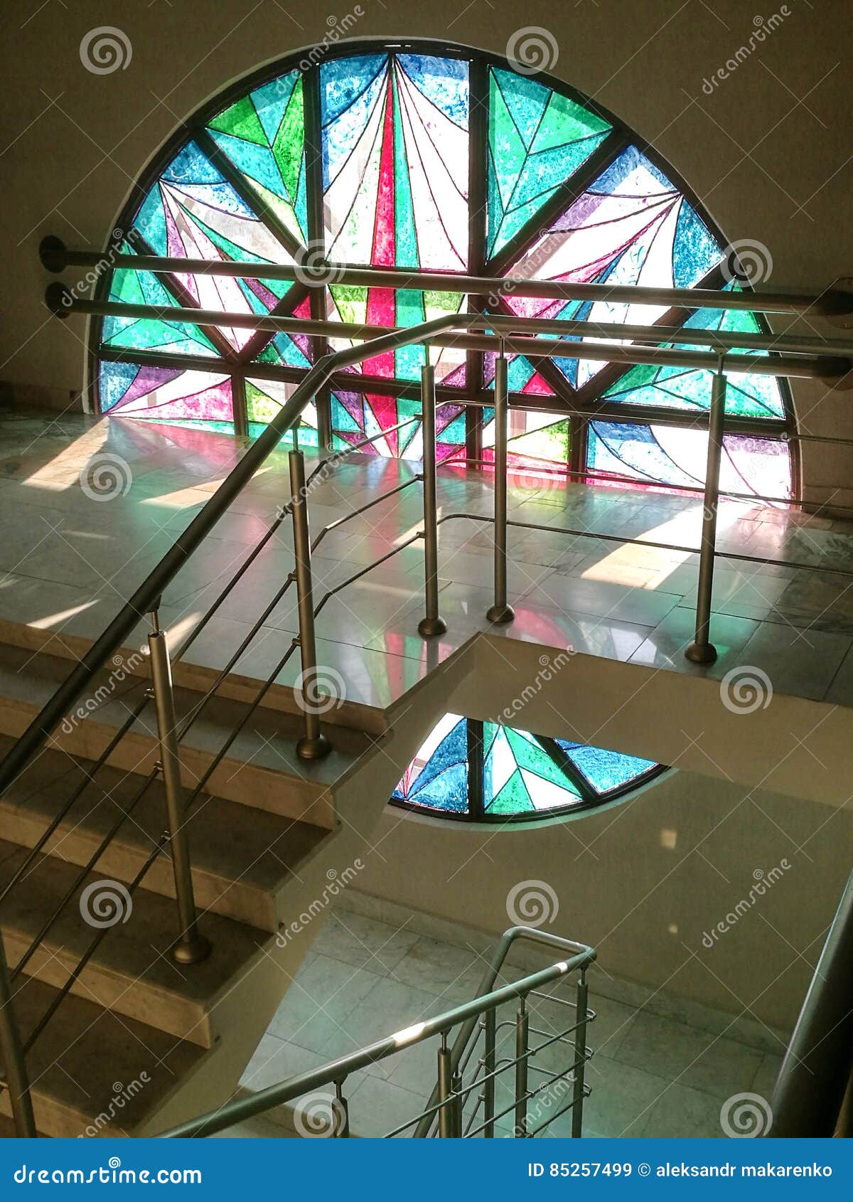 Stained Glass Window and Light Colored Spots on the Stairs. Stock Image ...