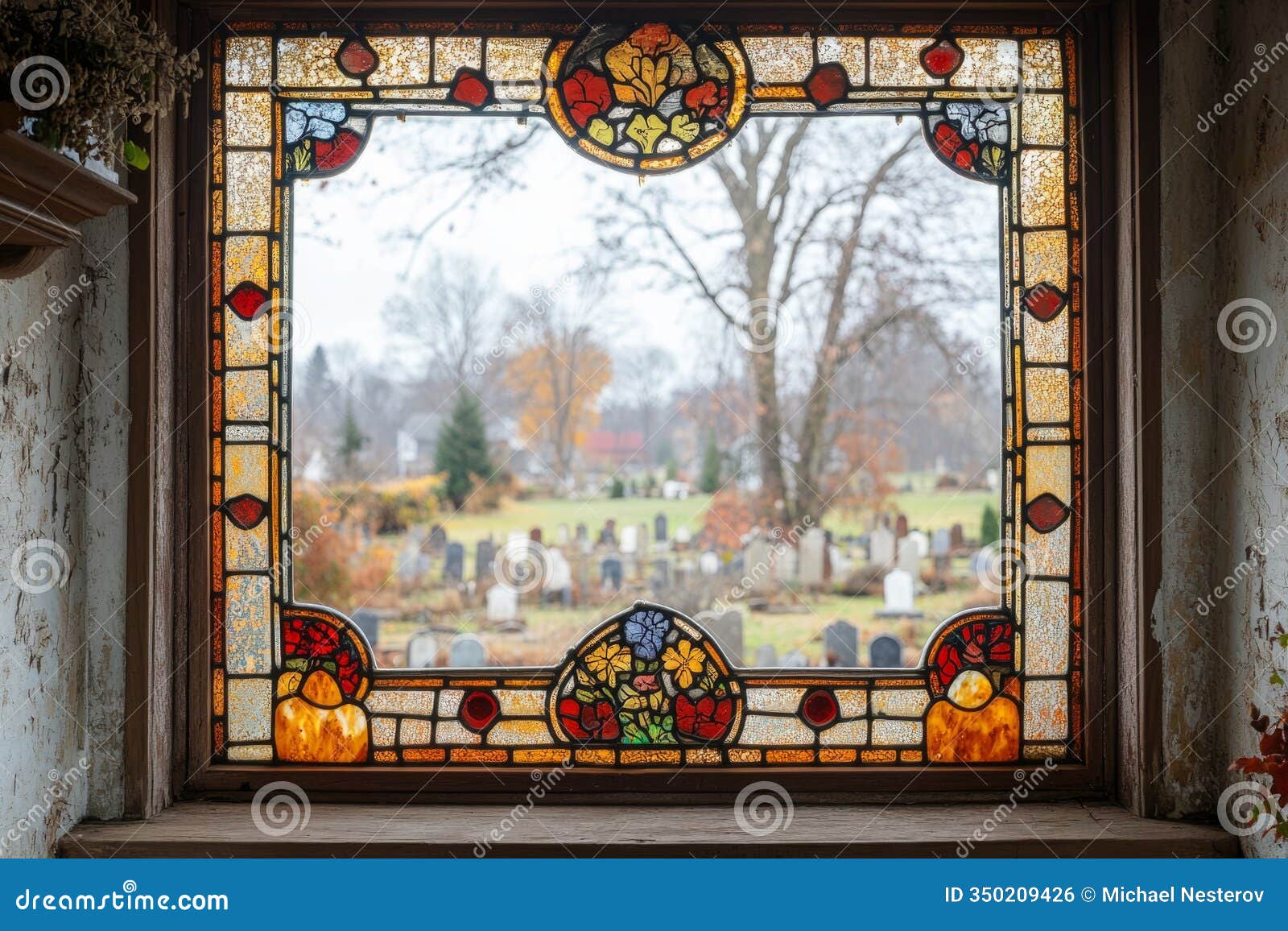 Stained Glass Window Overlooking Serene Cemetery in Daylight Stock ...