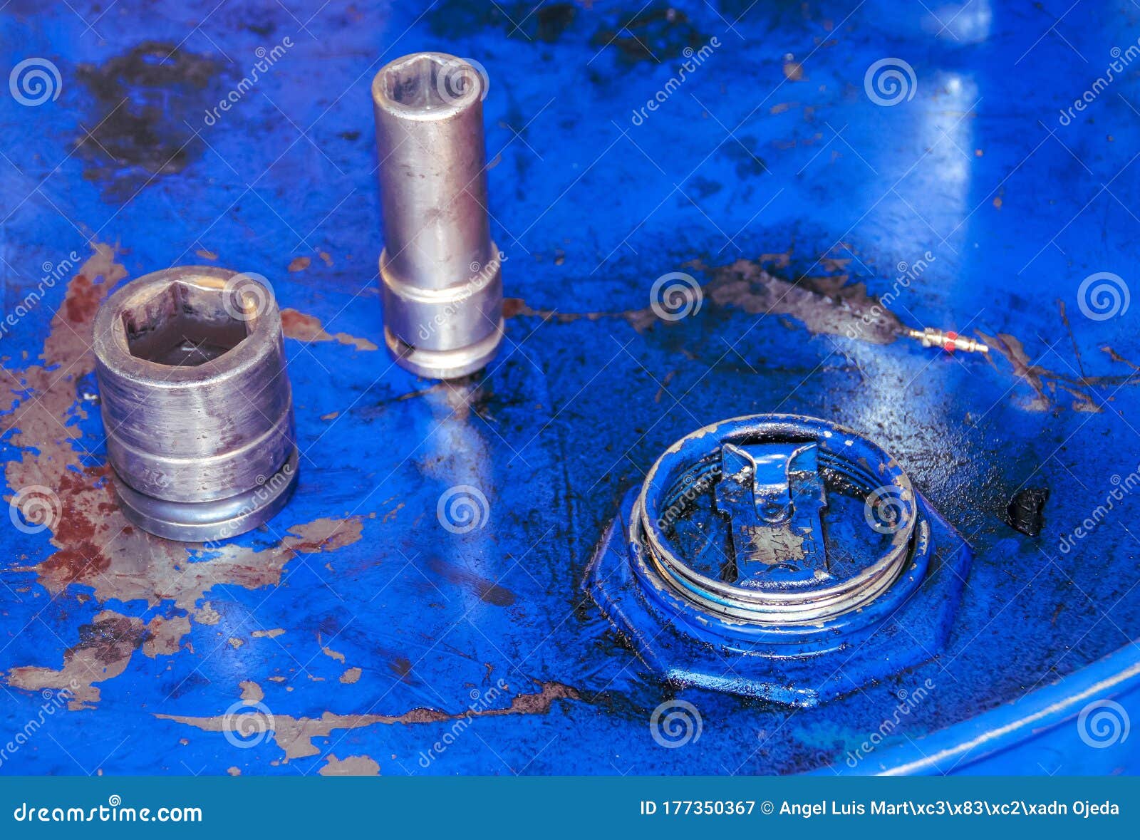 Grease and Oil Stained Pneumatic Wrench Heads on an Industrial Oil ...