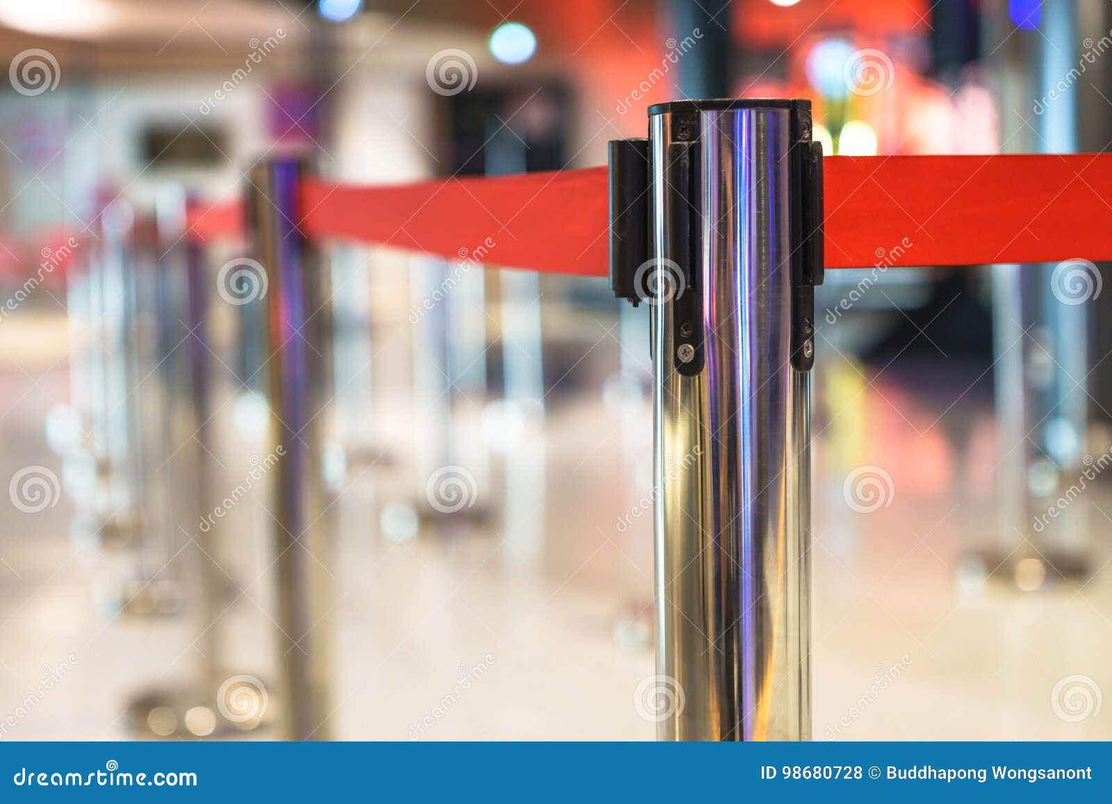 Stainless Barricade with Red Rope on a Blurred Interior Background ...
