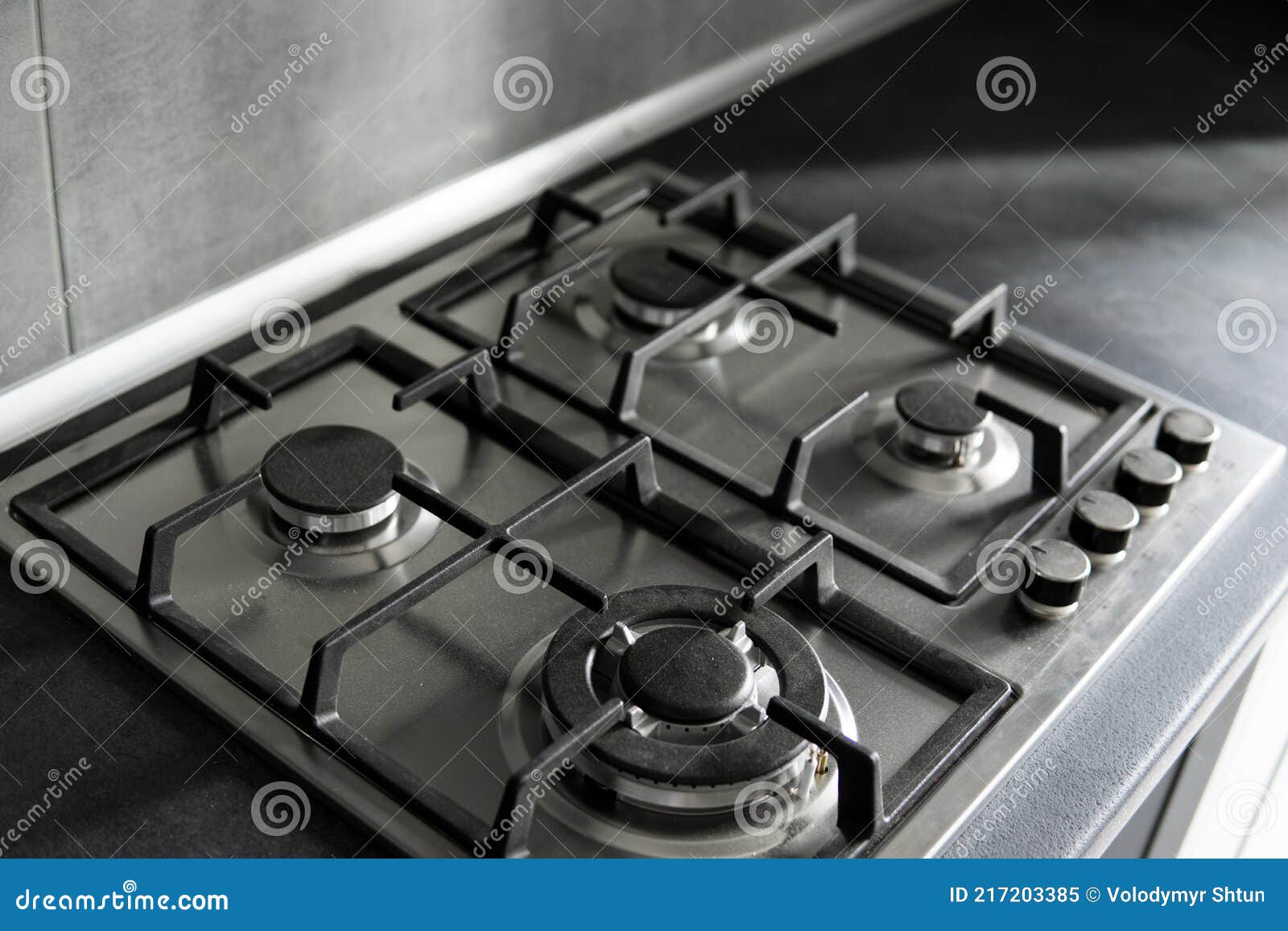 Stainless Grey Metal Kitchen Gas Stove Installed on a the Kitchen with ...