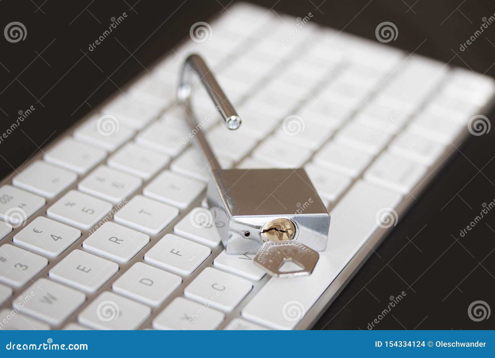 Stainless Padlock on Computer Keyboard. PC Network Security, Data ...
