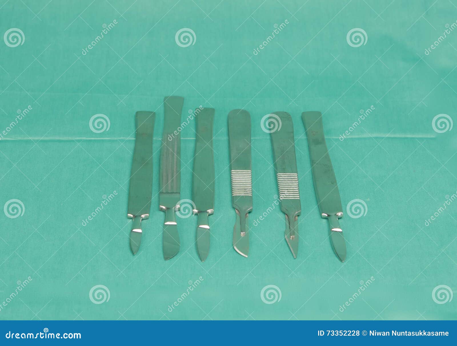 Stainless Scalpel on Green Fabric Stock Photo - Image of blade, surgeon ...