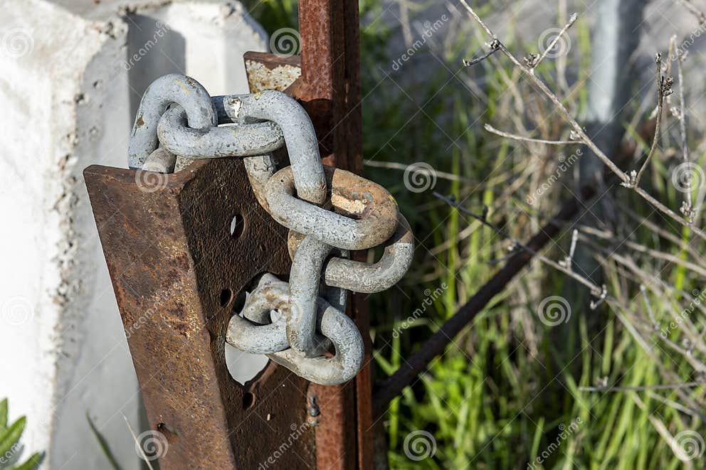 Stainless Steel Chains Winding a Rusty Metal Stock Image - Image of ...