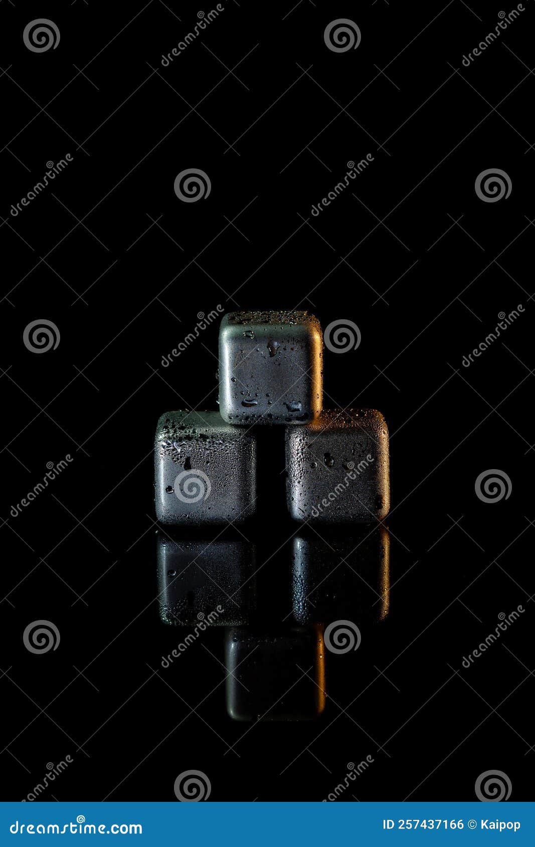 Stainless Steel Cubes Simulating Ice for Cooling Drinks on a Black ...