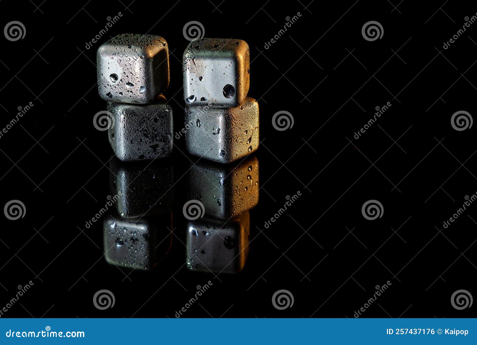 Stainless Steel Cubes Simulating Ice for Cooling Drinks on a Black ...