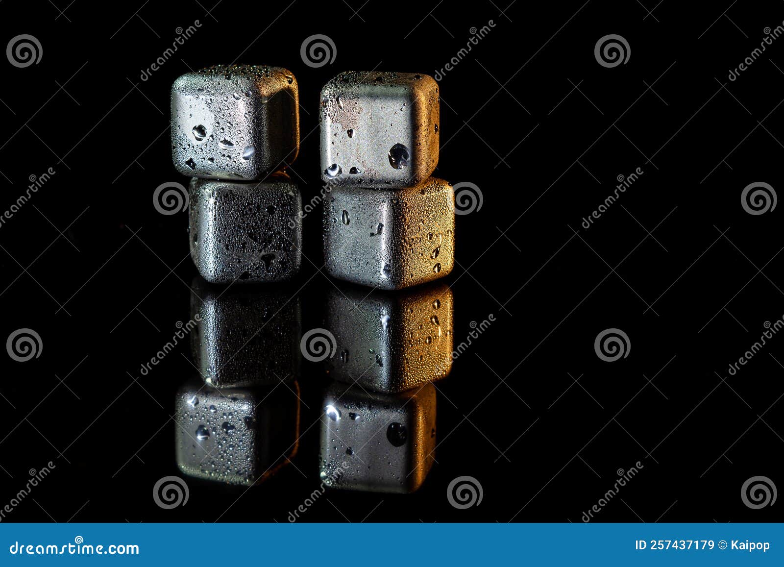 Stainless Steel Cubes Simulating Ice for Cooling Drinks on a Black ...