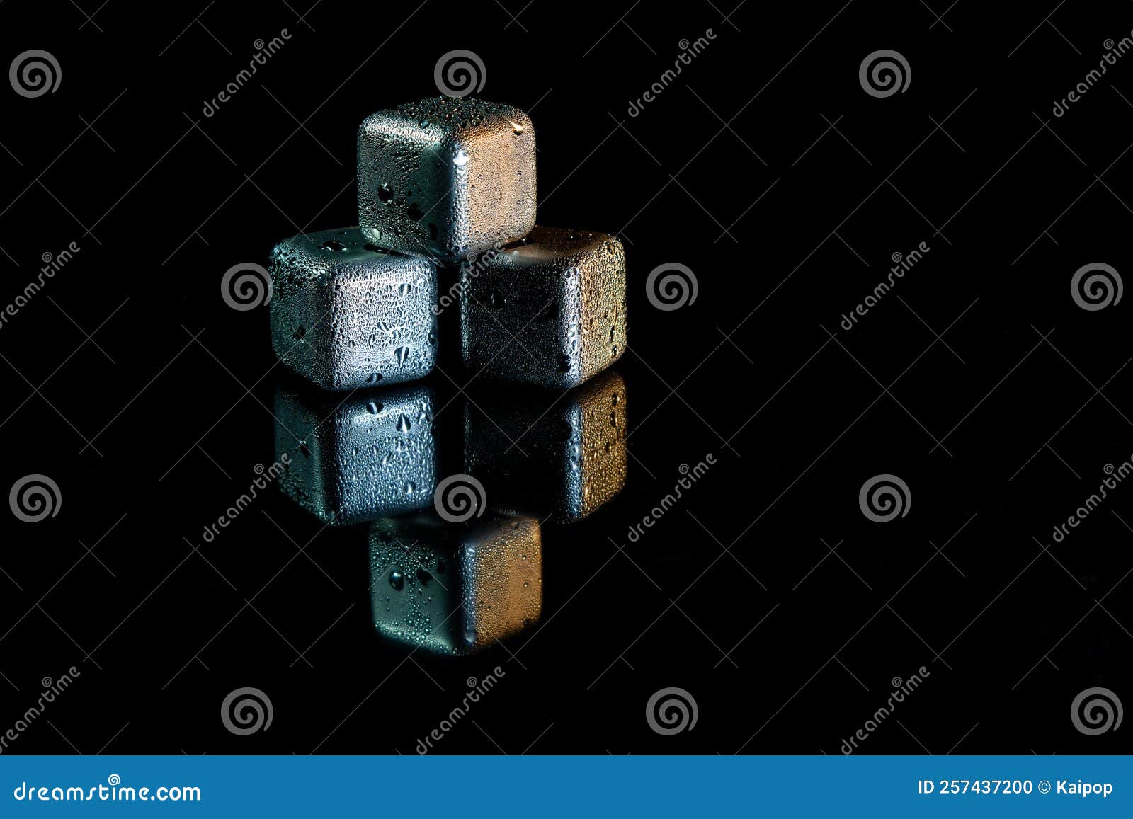 Stainless Steel Cubes Simulating Ice for Cooling Drinks on a Black ...