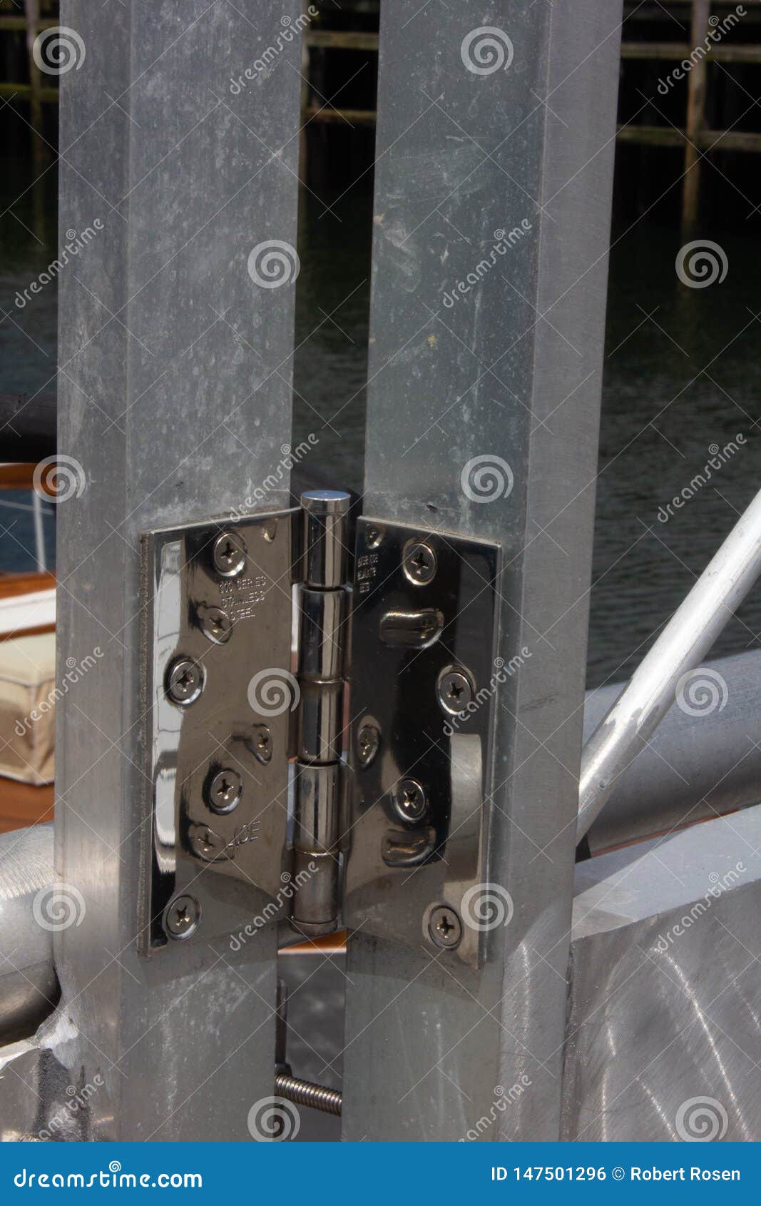 A Stainless Steel Hinge on a Gate Stock Photo - Image of hardware, gird ... A Stainless Steel Hinge on a Gate Stock Photo - Image of hardware, gird ...