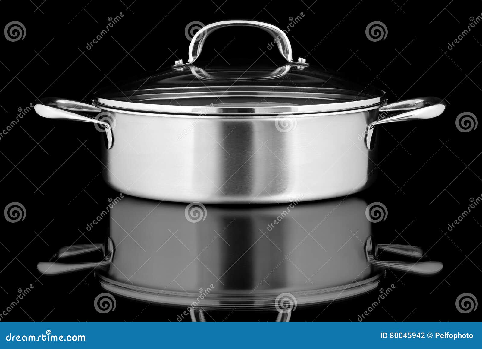 Stainless Steel Pot on a Black Shiny Surface. Stock Photo - Image of ...