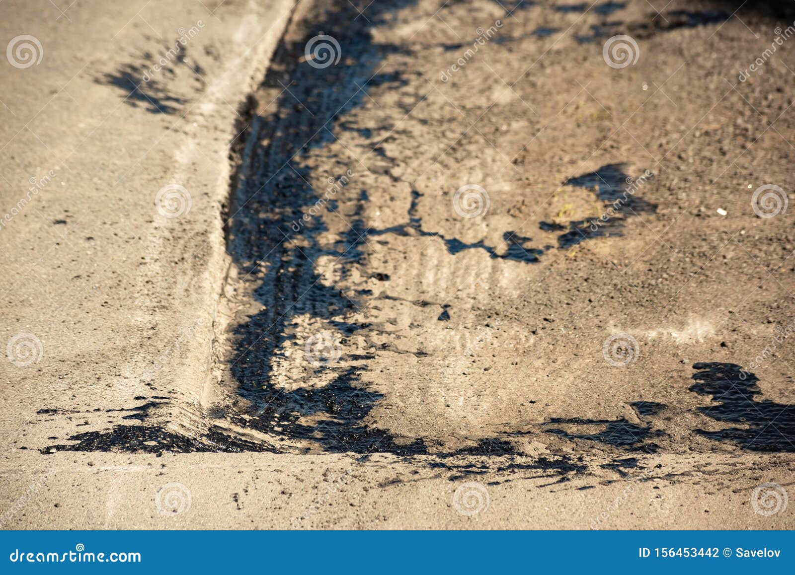 Stains from Bitumen on the Surface of Asphalt Under Construction Stock ...