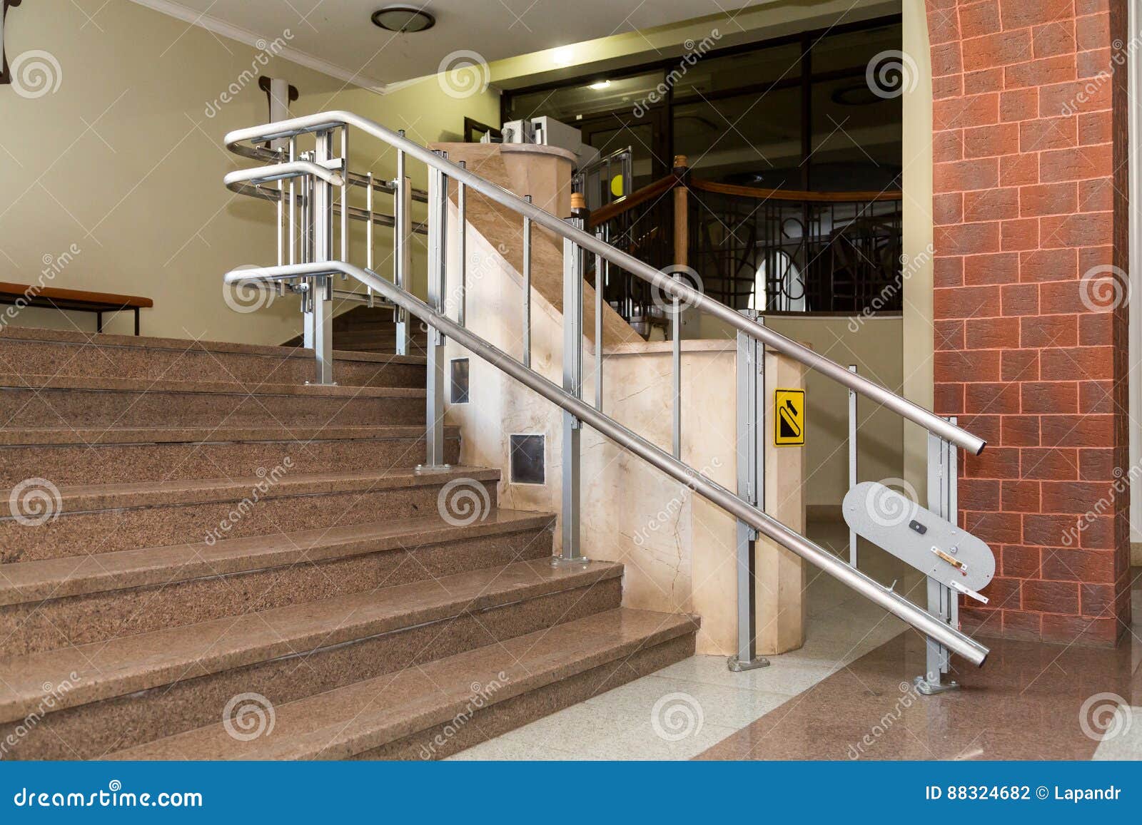 Stair Lift for the Disabled. Stairs of Public Building Stock Photo ...