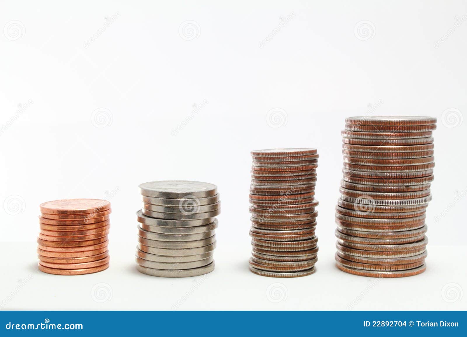 Stair Stepped Stacks of US Coins Stock Photo - Image of white, coins ...