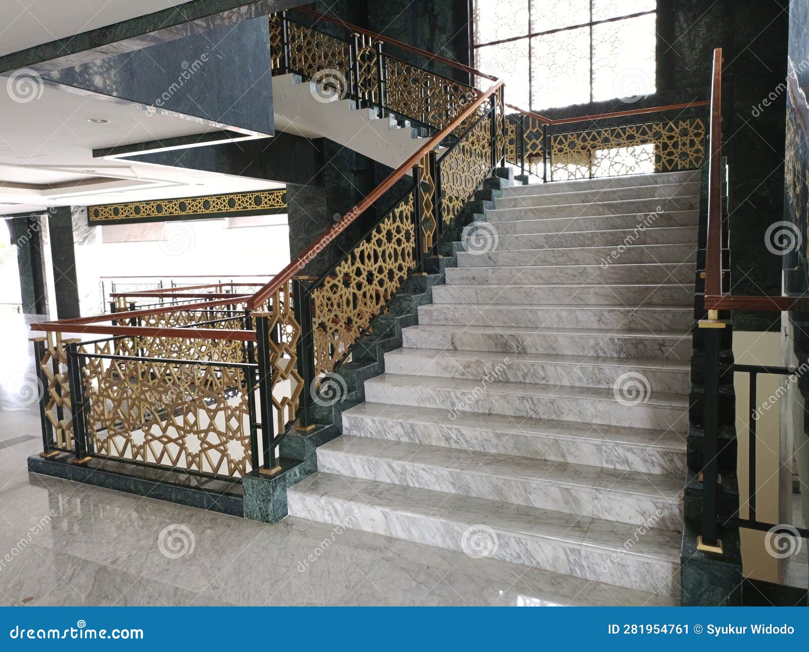 A Staircase with an Octagonal Patterned Railing in a Large Mosque Stock ...