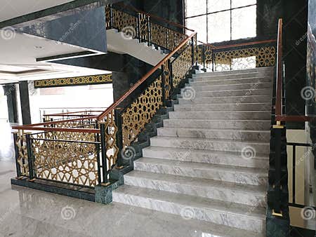 A Staircase with an Octagonal Patterned Railing in a Large Mosque Stock ...