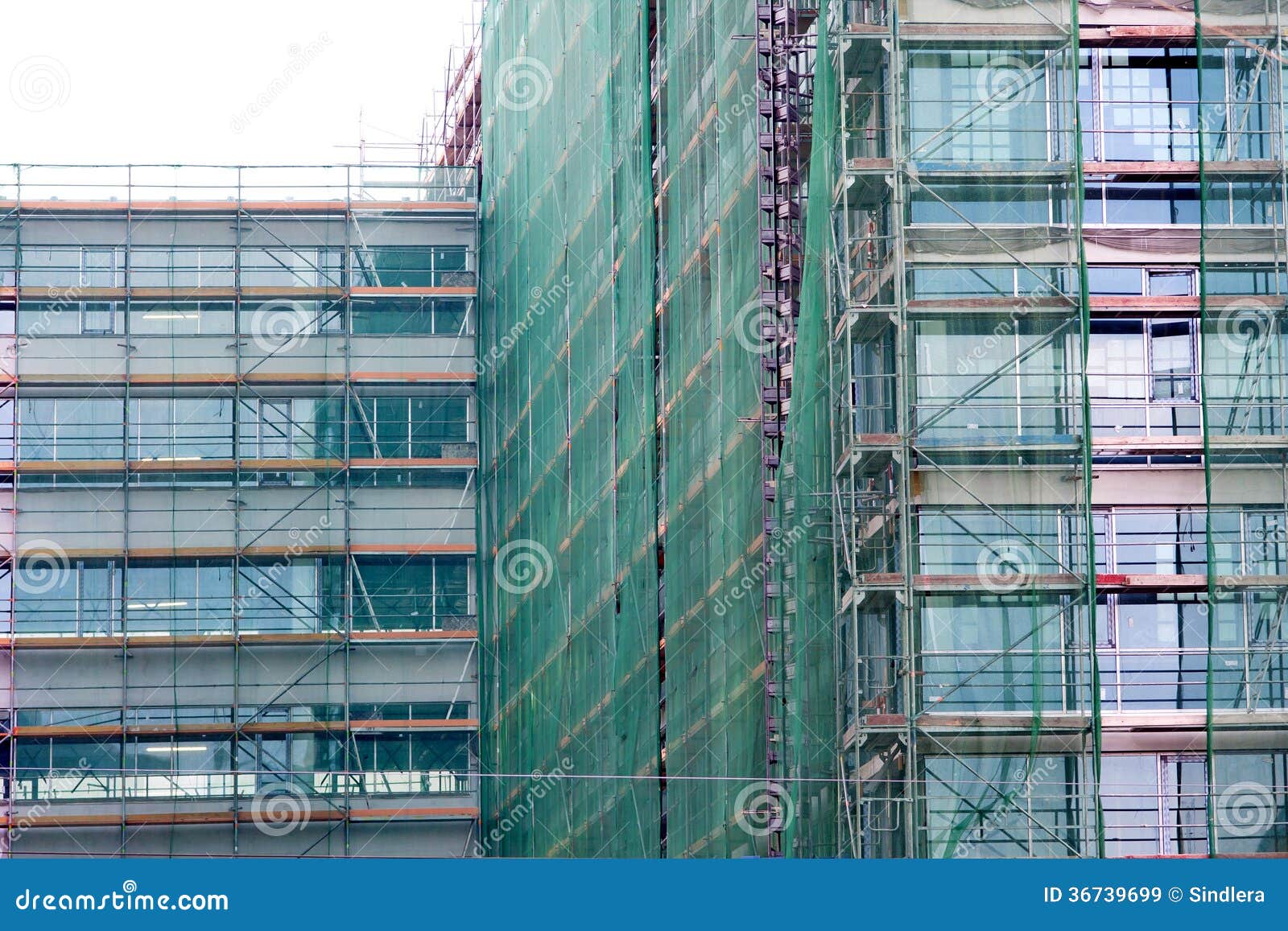 Staircase and Scaffolding on a Construction Site,covered with Mesh ...