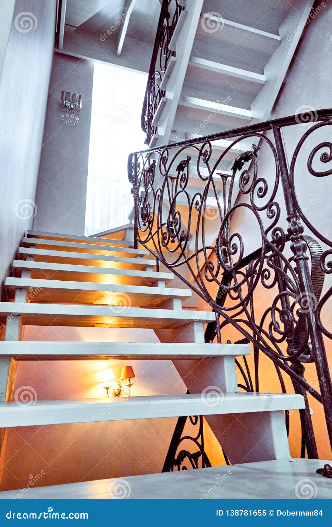 Staircase with Wrought Iron Railing in an Empty House Stock Image ...