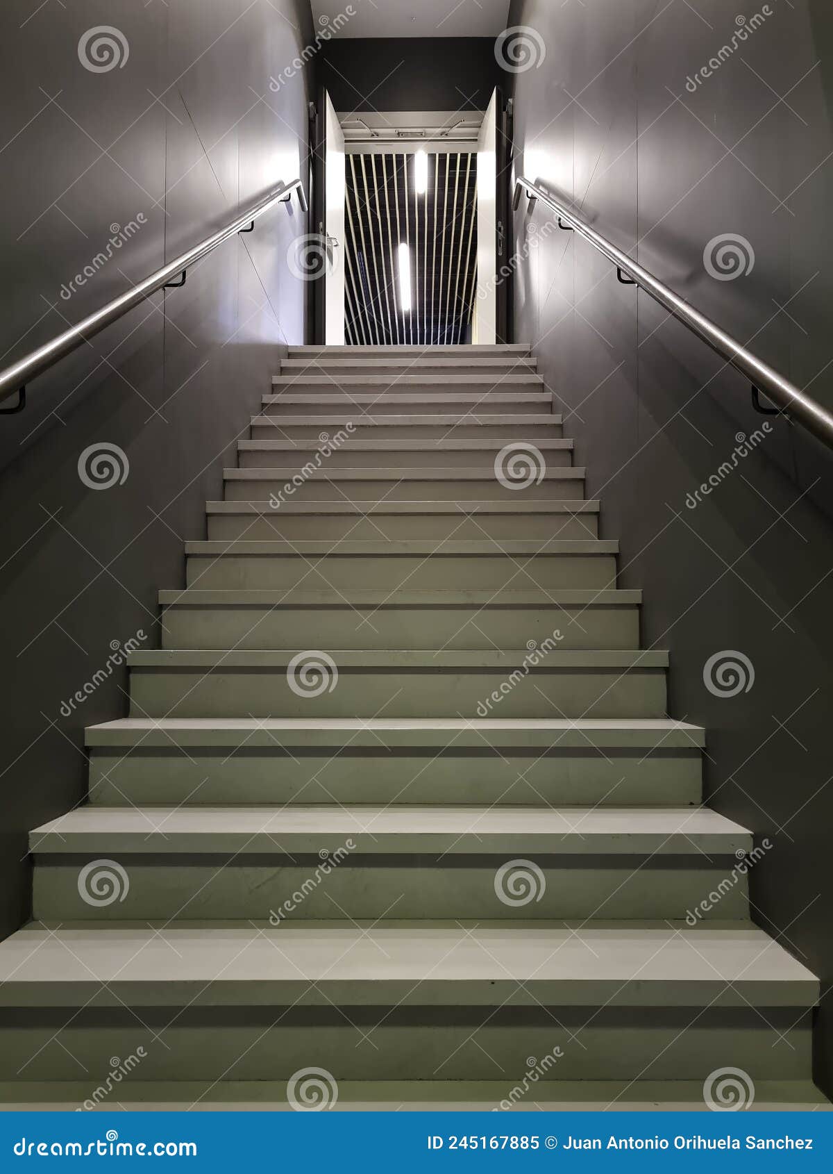 Stairs ascending to a door stock image. Image of design - 245167885
