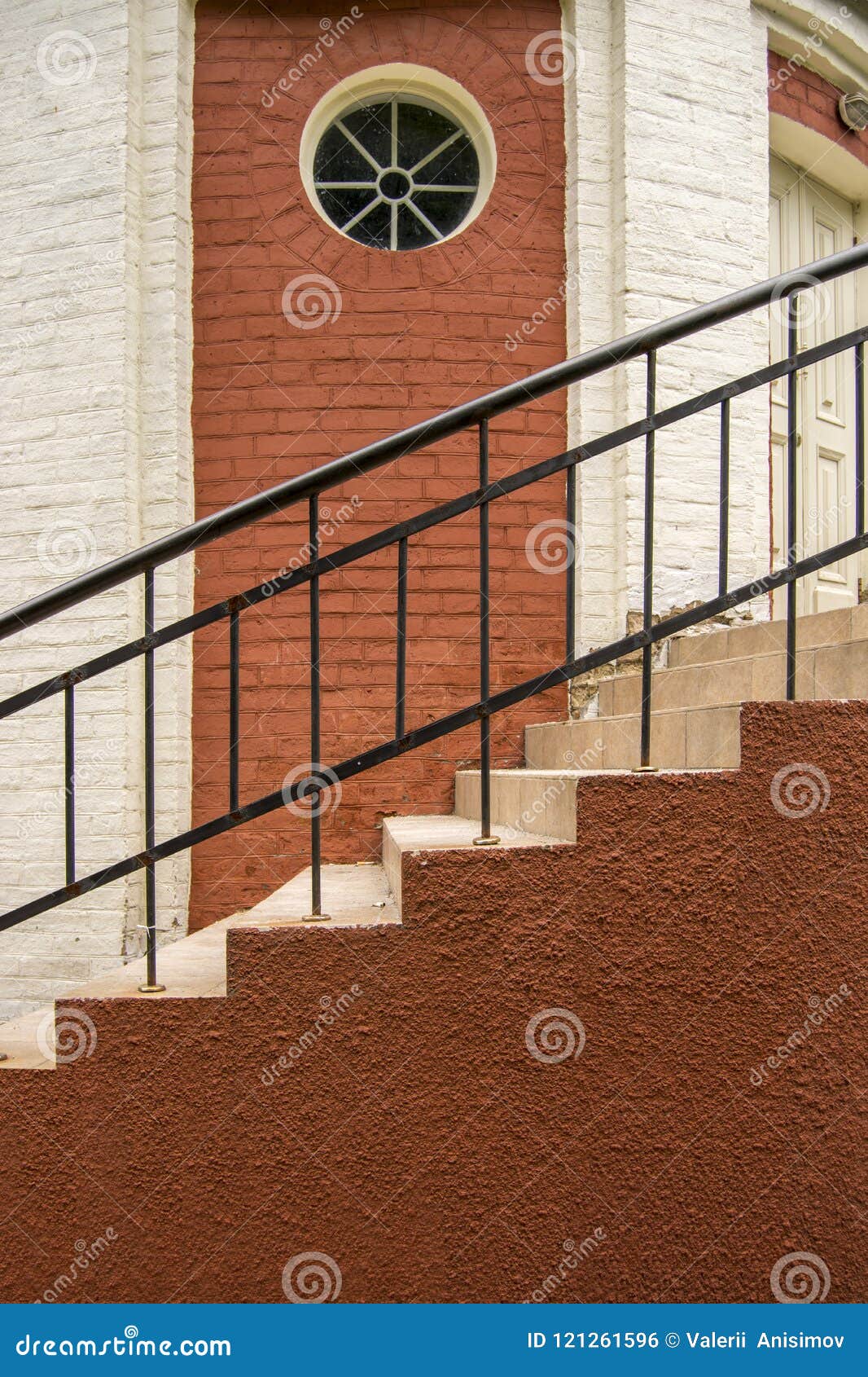 Stairs in a Brick House. Round Window in the Wall Stock Photo - Image ...