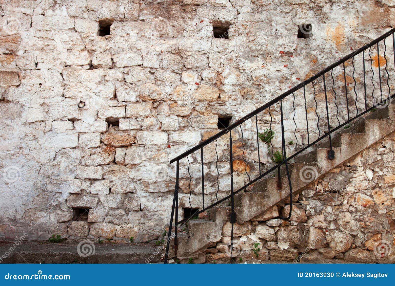 Stairs with Railing Against the Old Stone Walls Stock Photo - Image of ...