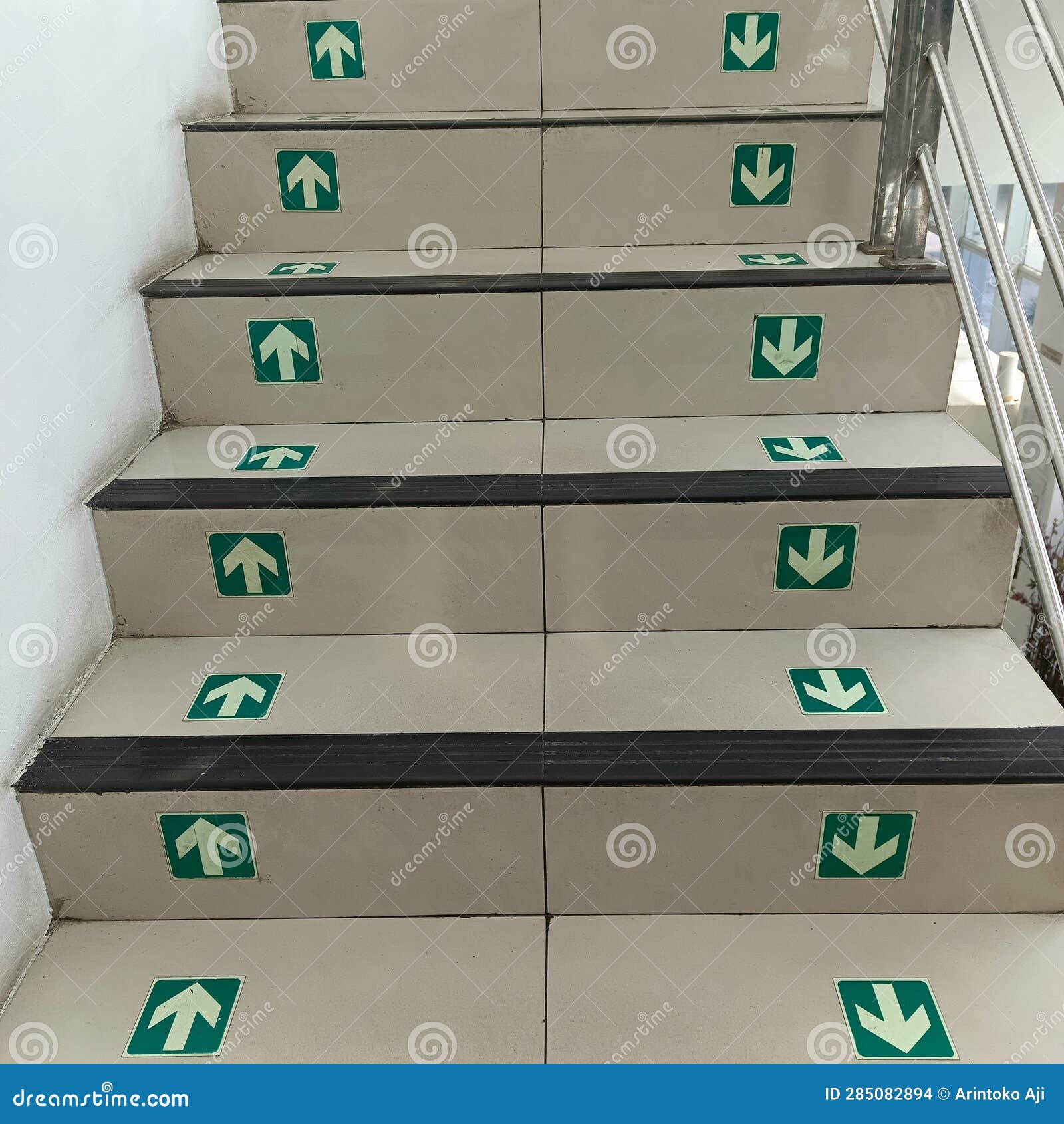 Stairs that Use Signposts for Up and Down Directions Stock Photo ...