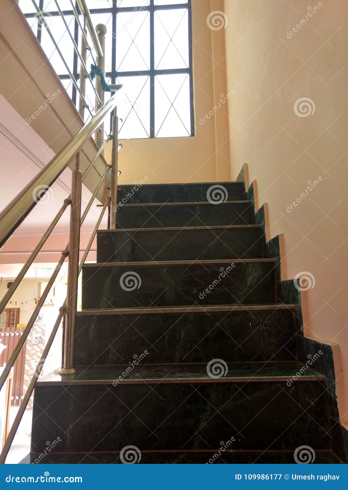 A stairway with railing stock image. Image of indoor - 109986177