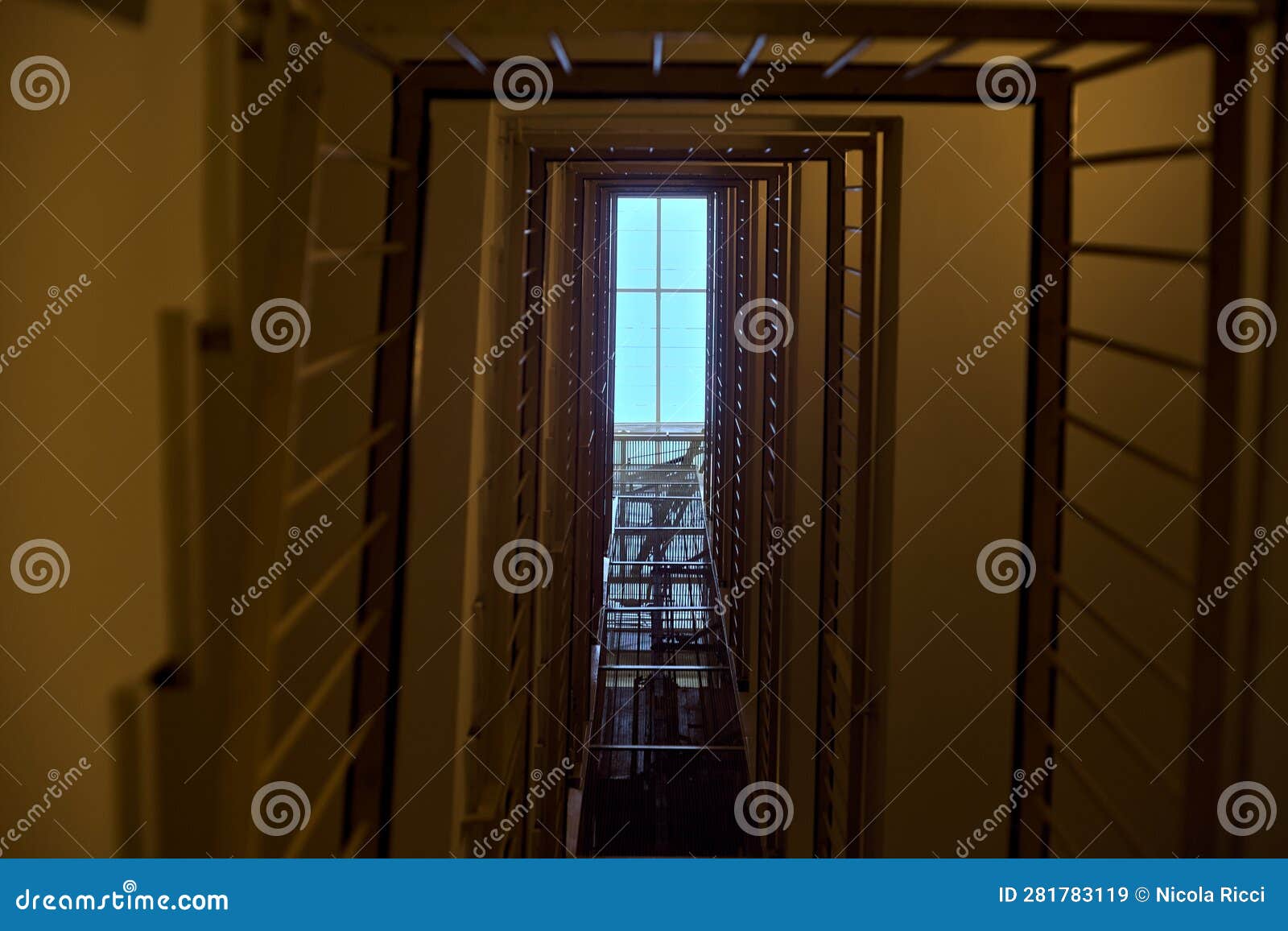 Stairwell and Elevator in a Residential Building with a Window on the ...
