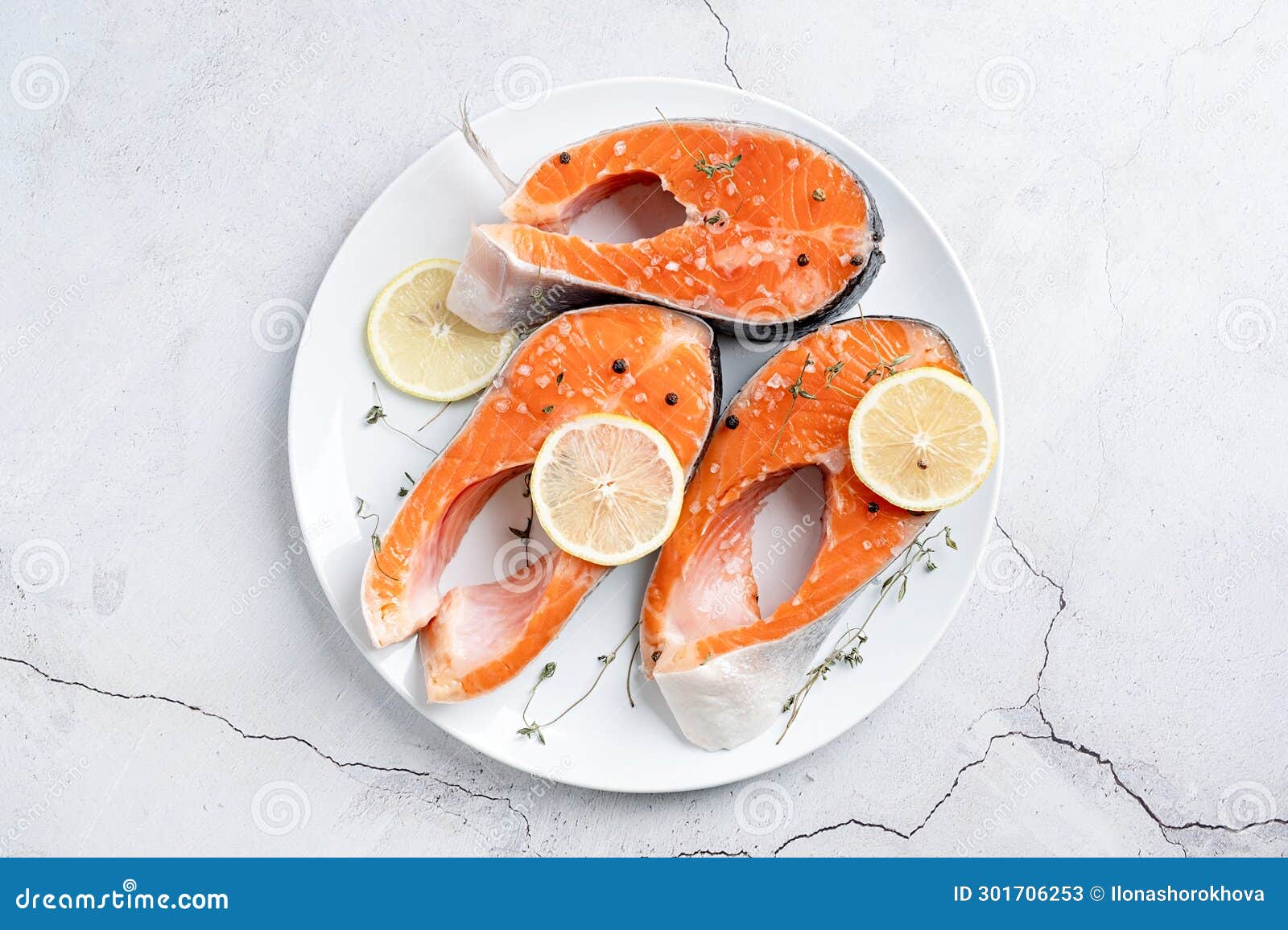 Stake Fish Trout with Lemon and Spices on Cement Background Stock Image ...