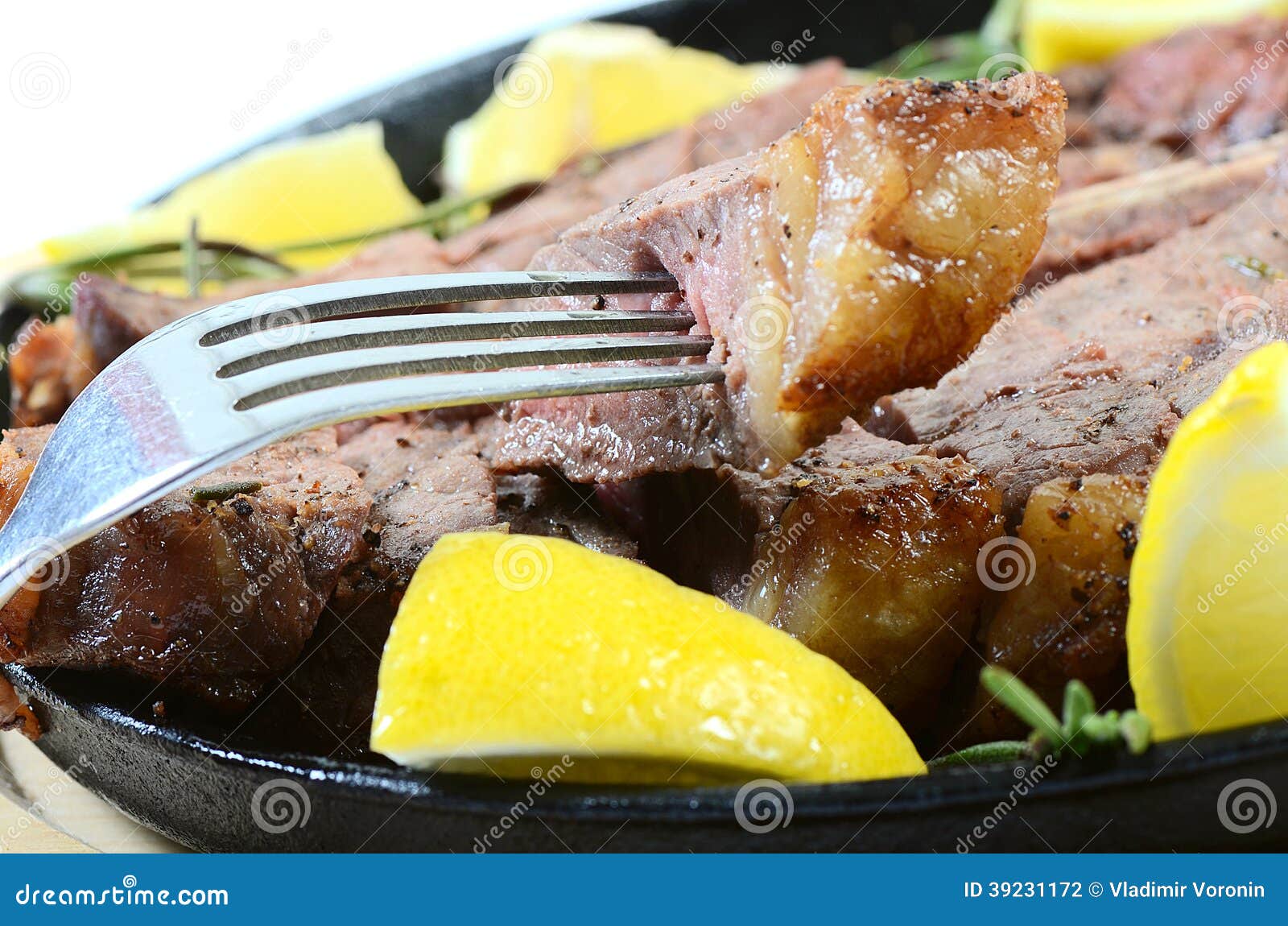 Stake from Mutton with a Lemon Stock Photo - Image of dinner, dish ...