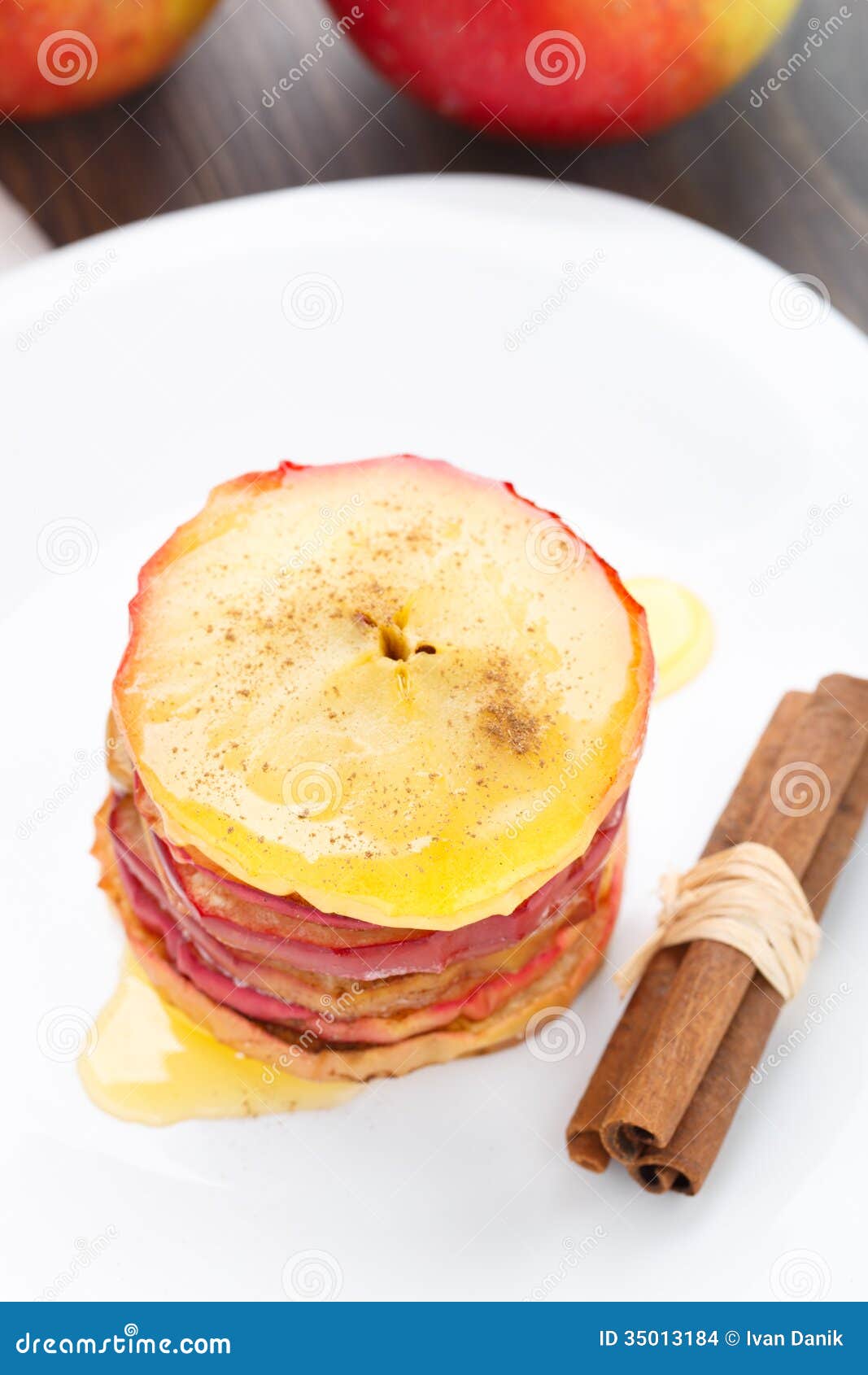 Stake of Sliced Baked Apple Stock Photo - Image of plate, white: 35013184