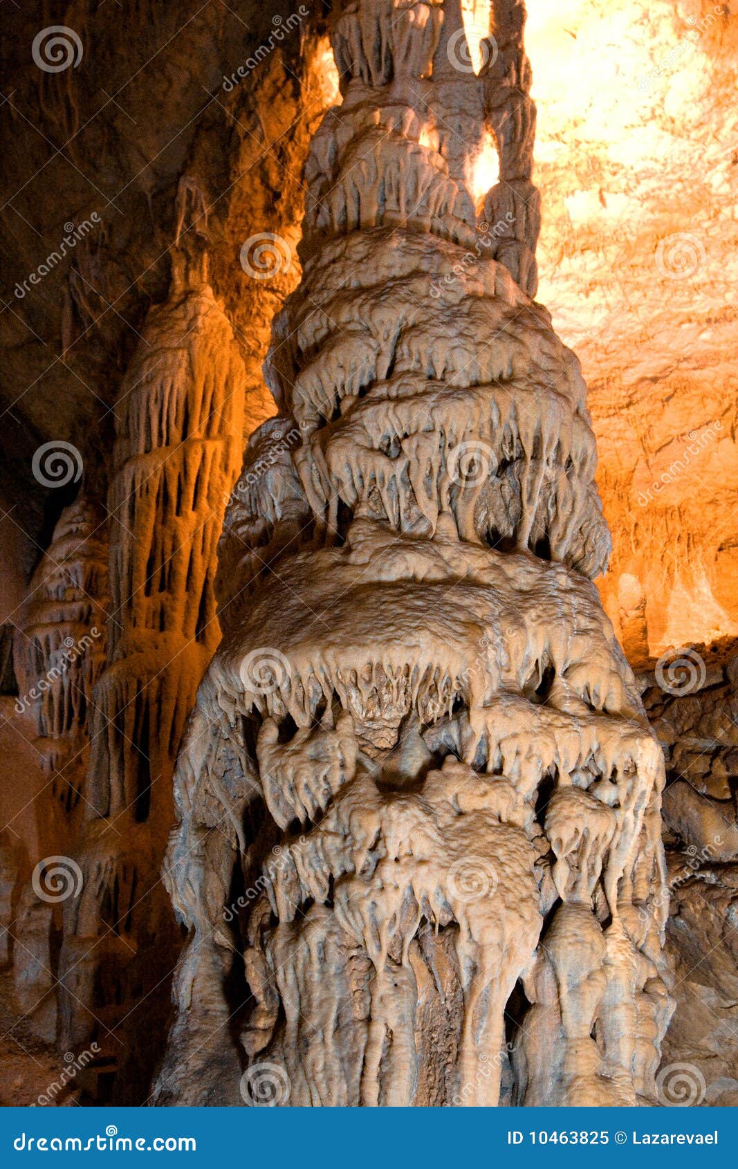 Stalactite column in cave stock image. Image of beneath - 10463825