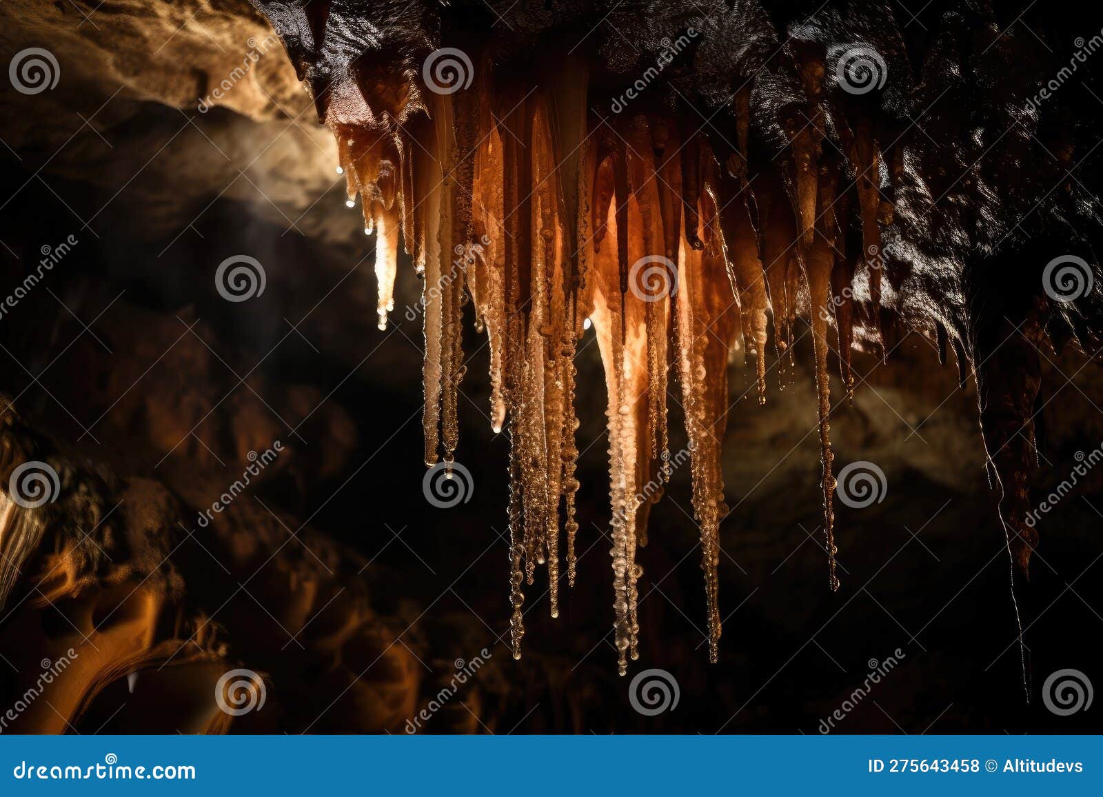 Stalactite, Hanging from the Ceiling of Cave, with Droplets of Water ...