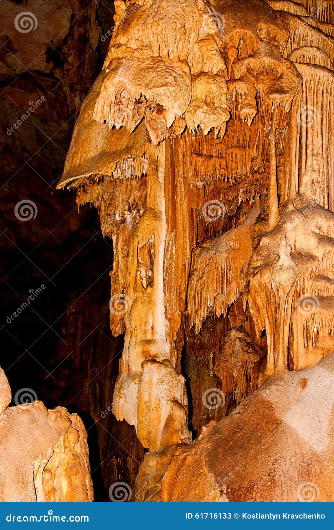 Stalactite and Stalagmite Formations on the Wall of an Underground Cave ...