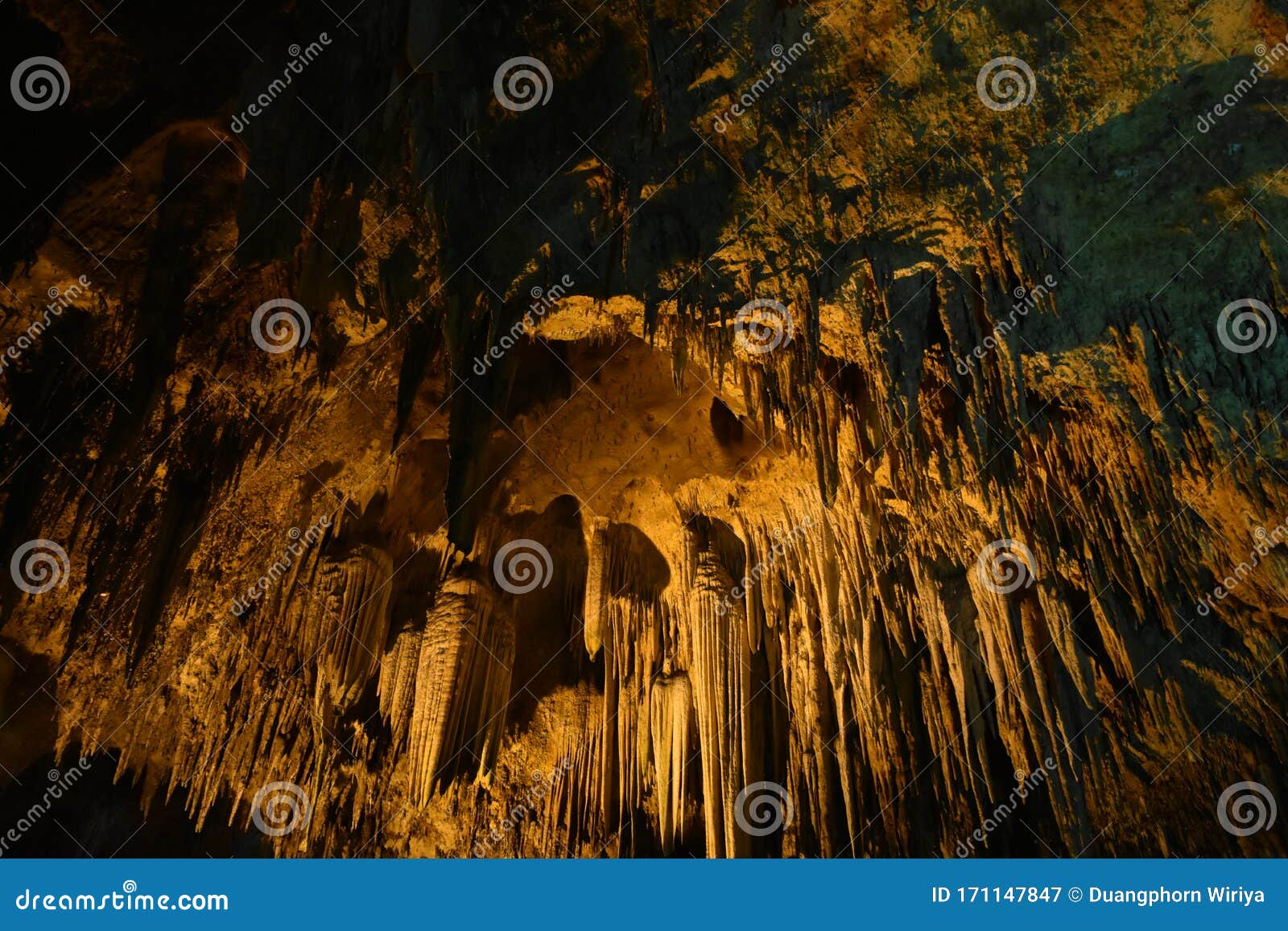 Stalactite and Stalagmite Hanging from Ceiling in the Cave Stock Image ...