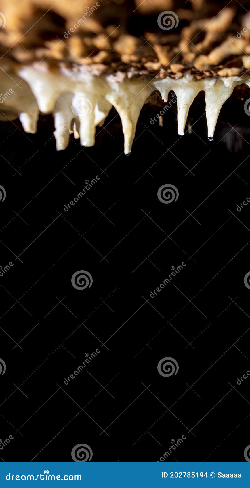 Stalactites with Water Drops Against Black Background Stock Photo ...
