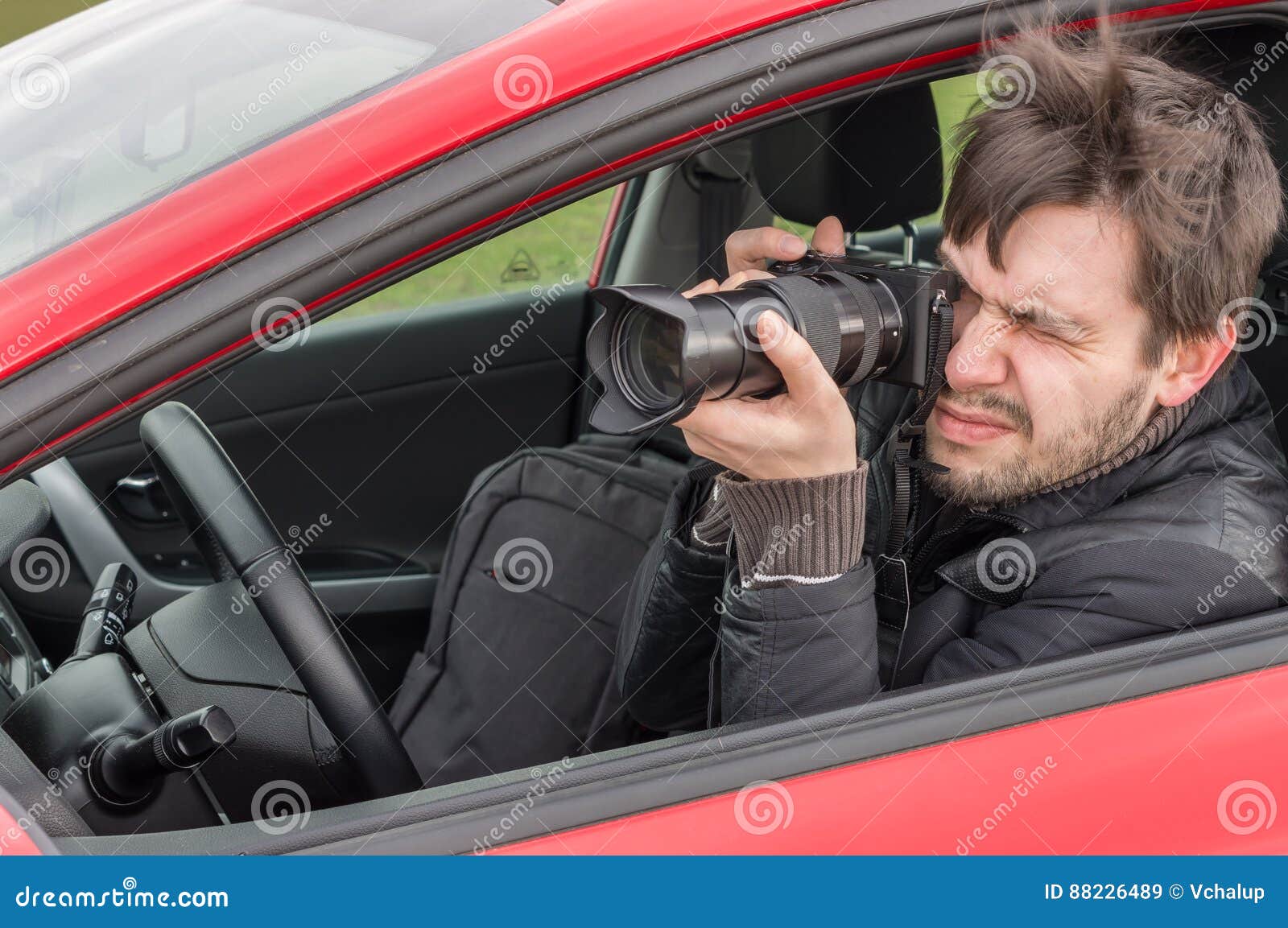 Stalker or Paparazzi is Taking Photo with Camera from Car Stock Image ...