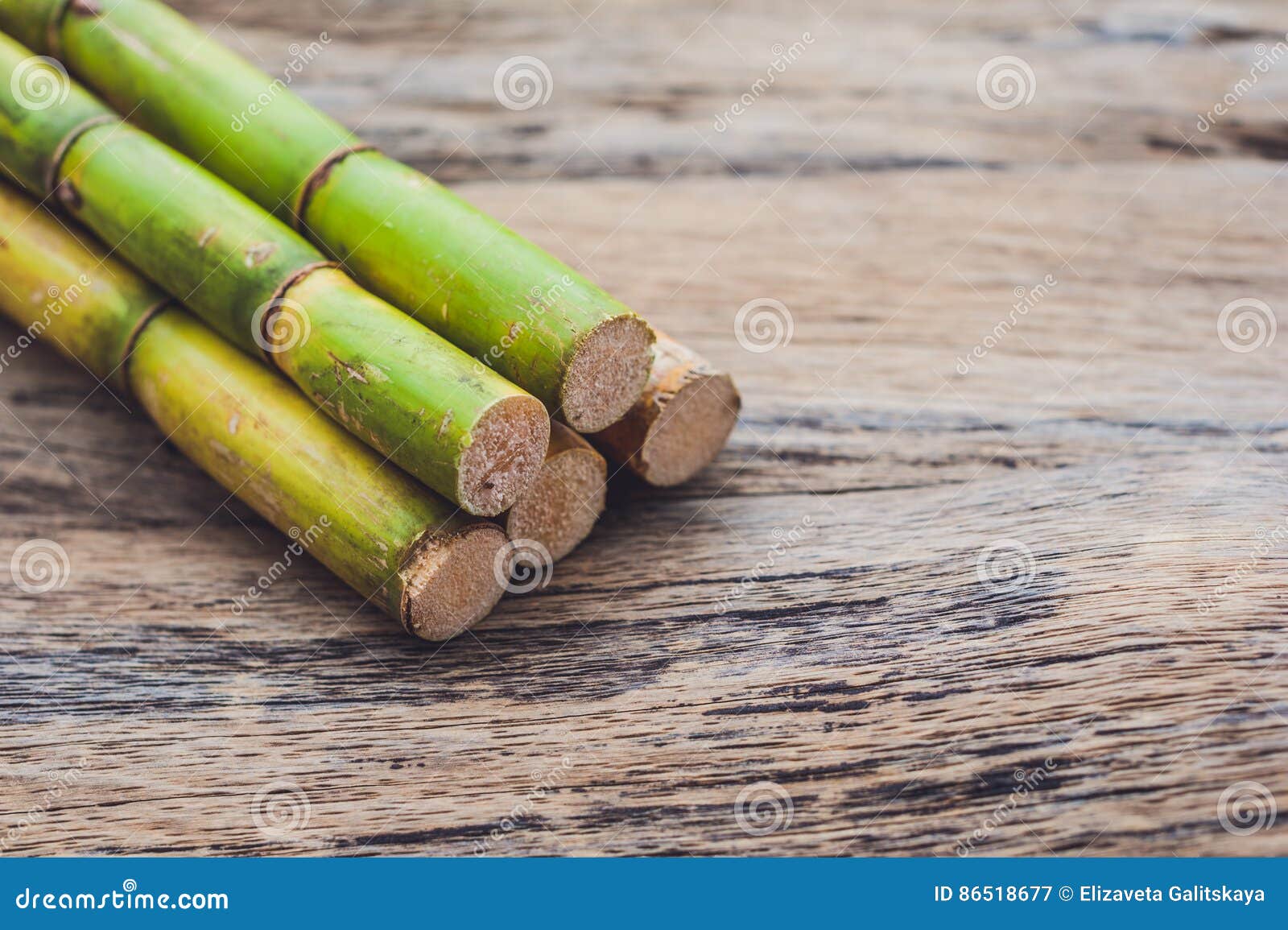 Stalks Of Sugar Cane On The Old Wooden Background Stock Image - Image ...