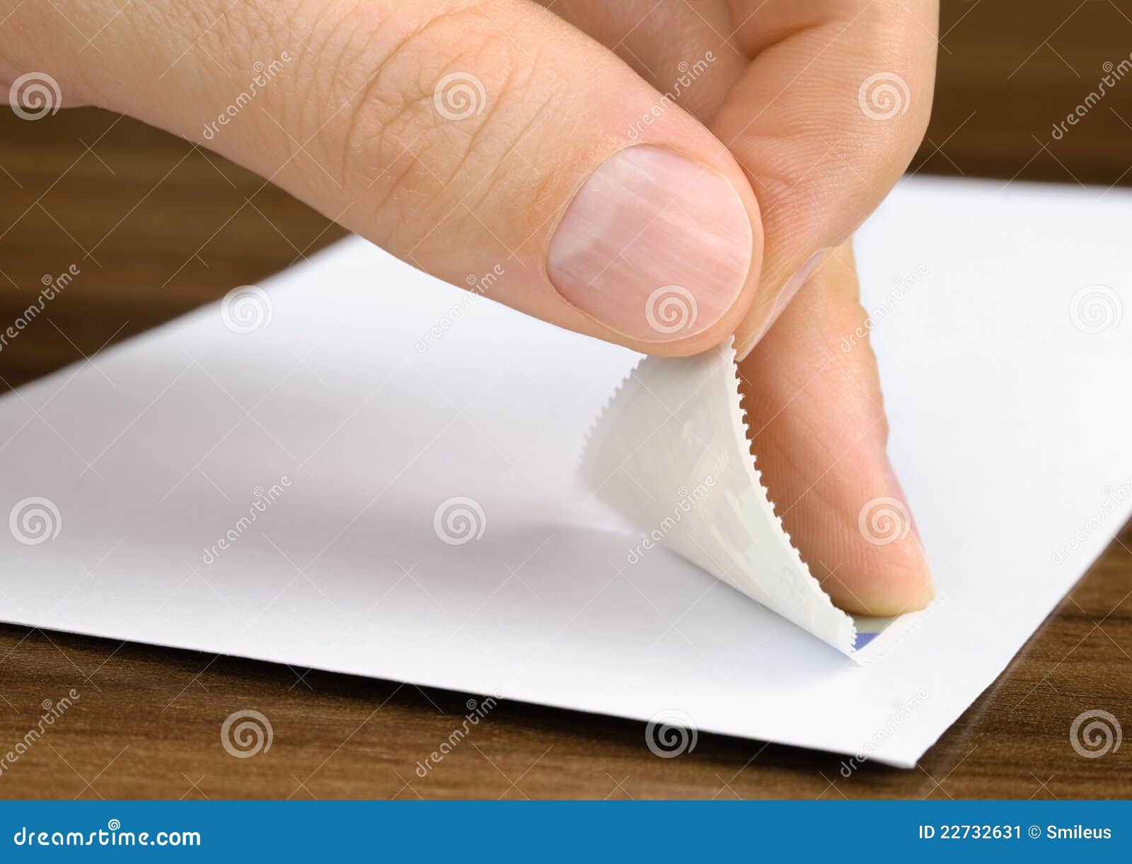 Stamp Being Pasted Onto an Envelope Stock Image - Image of stamp ...
