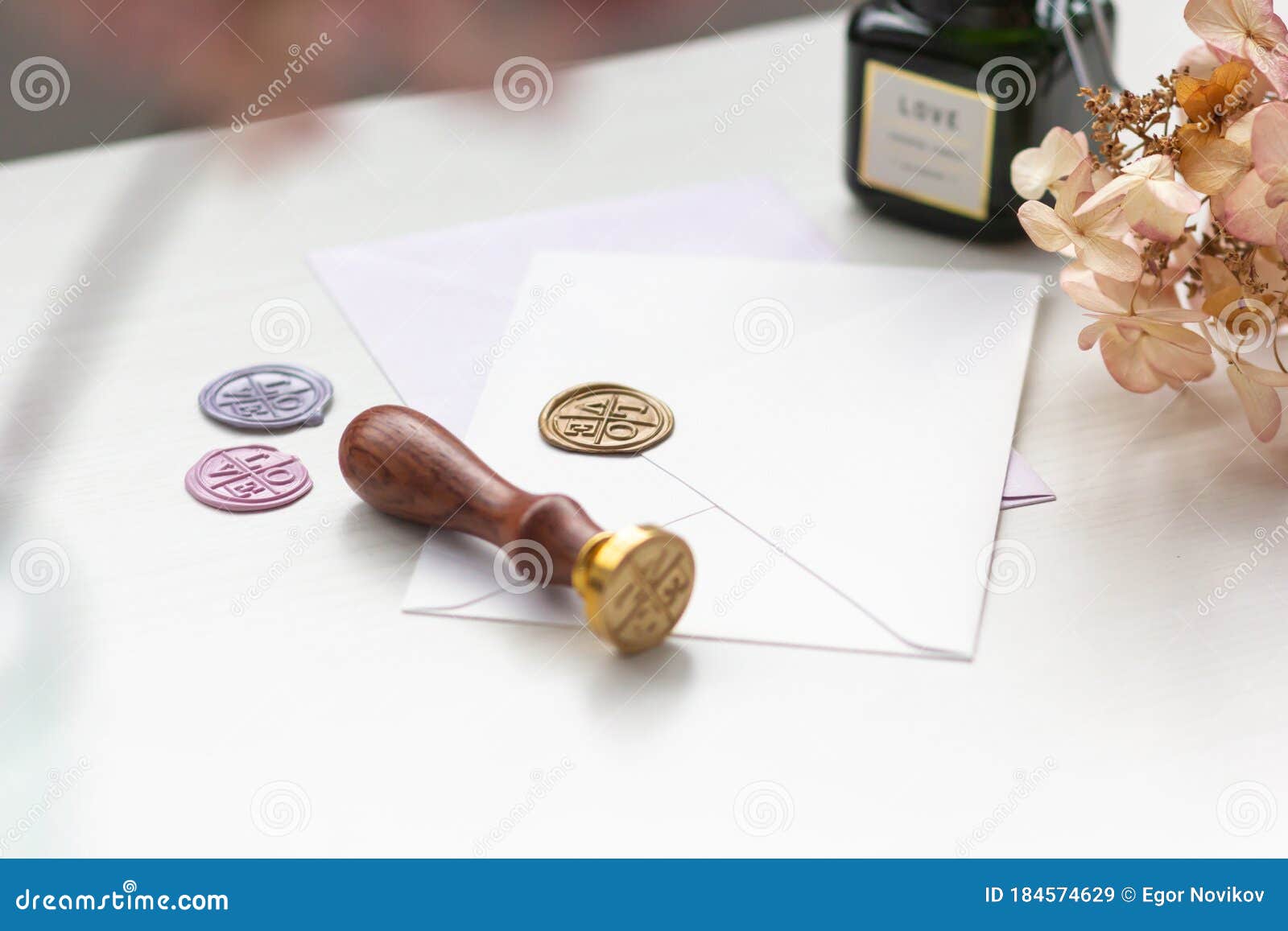 Stamp and Envelopes on a Light Table with Documents Stock Image - Image ...