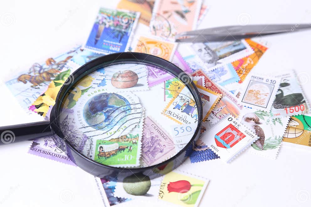 Stamp under magnifier editorial stock image. Image of philately - 35604099
