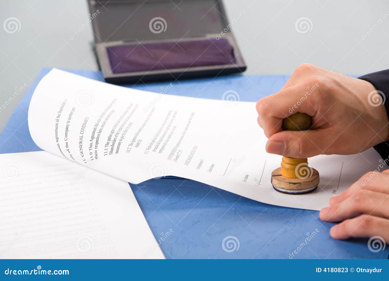Stamping the document stock image. Image of hand, senior - 4180823 Stamping the document stock image. Image of hand, senior - 4180823