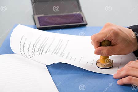 Stamping the document stock image. Image of hand, senior - 4180823