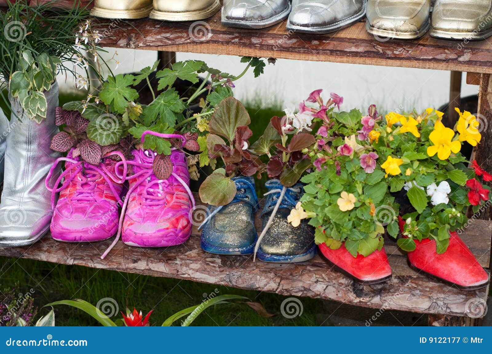 Stand with Flowers Planted in Shoes Stock Image - Image of idea, doors ...