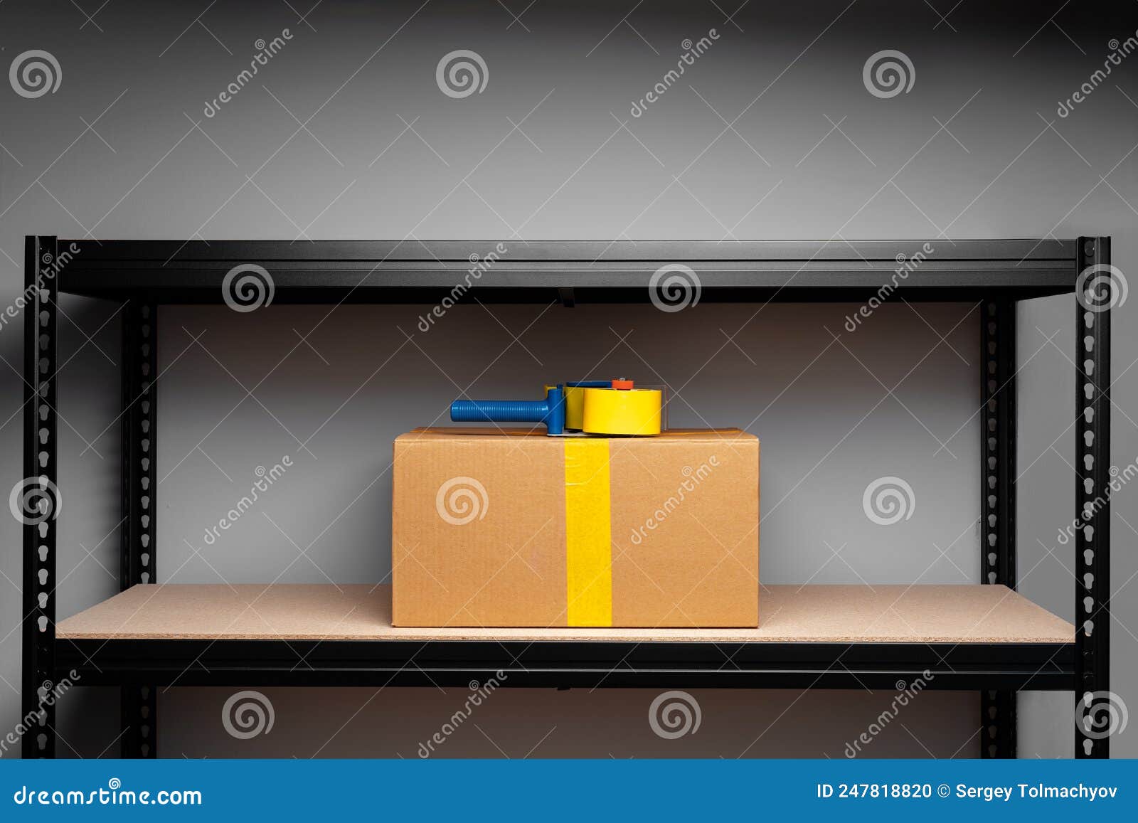 Stand Shelf with One Packed Cardboard Box Stock Photo - Image of ...