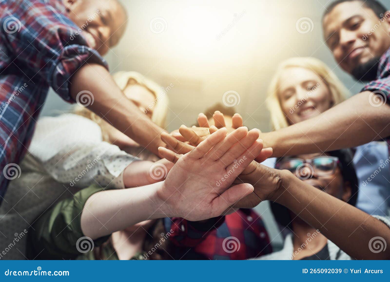 We Stand United. a Group of People Putting Their Hands Together. Stock ...