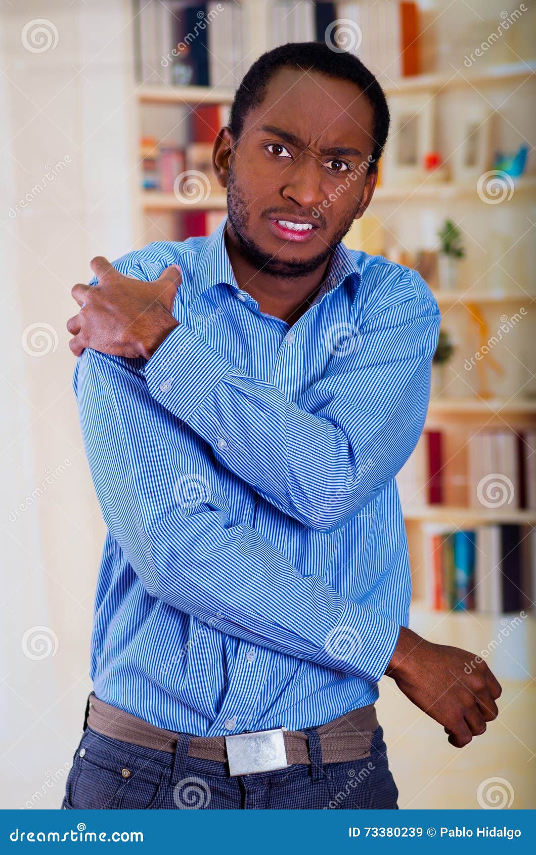 Stand Up Man Holding His Shoulder with His Hands and Pain Face ...