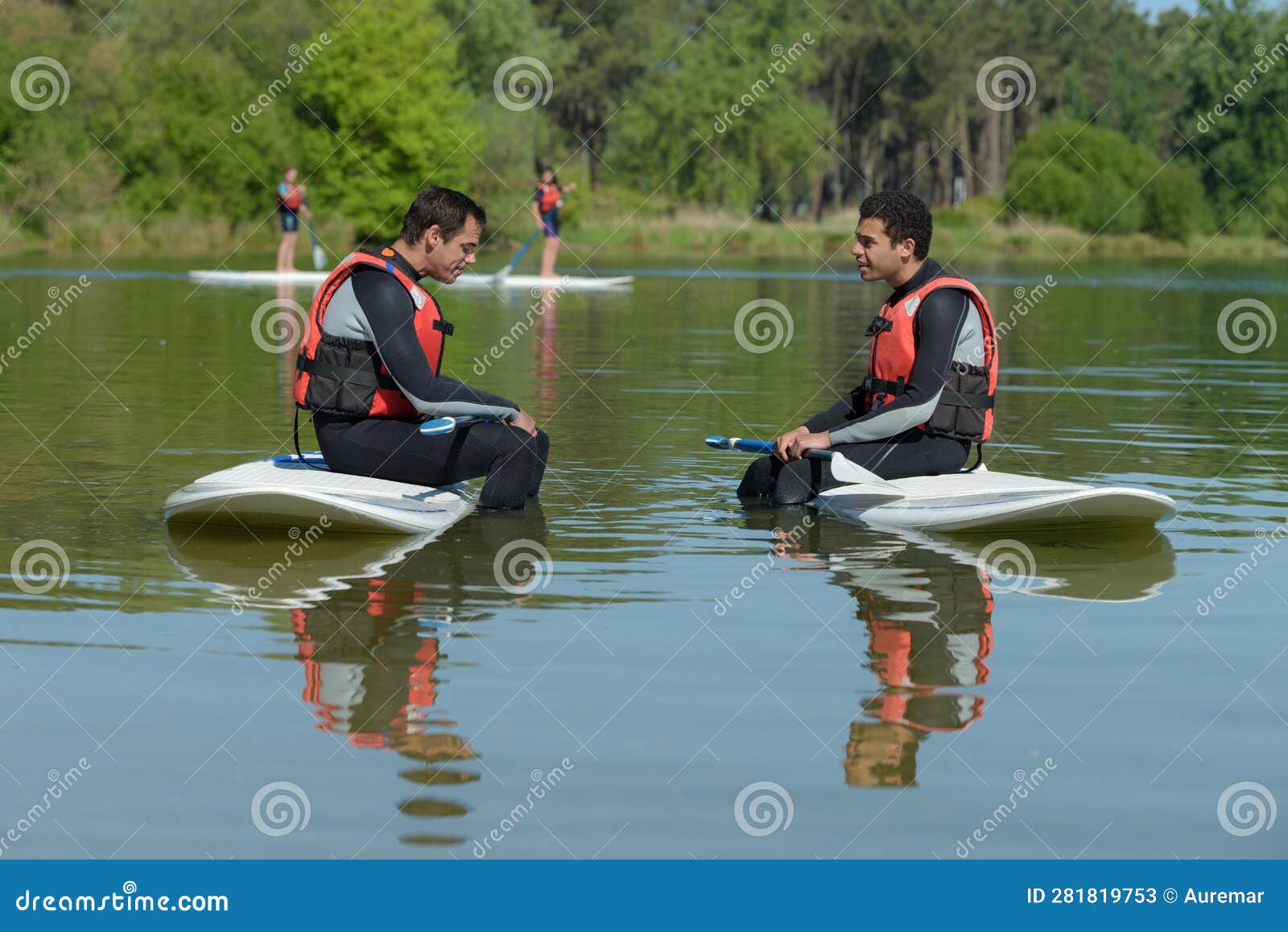 Stand Up Paddle Board Men Talking Stock Image - Image of beach, holding ...